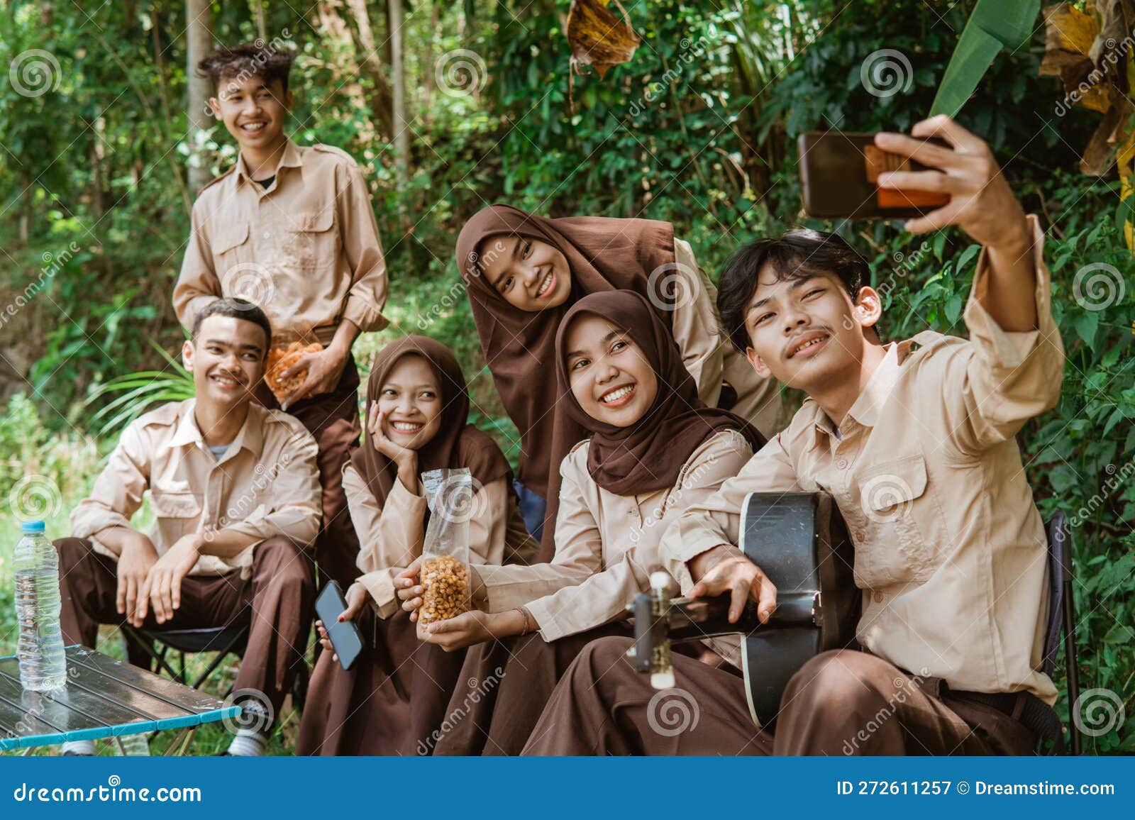 Group of Youth Scouts Taking Selfies Together Using a Cellphone Stock ...