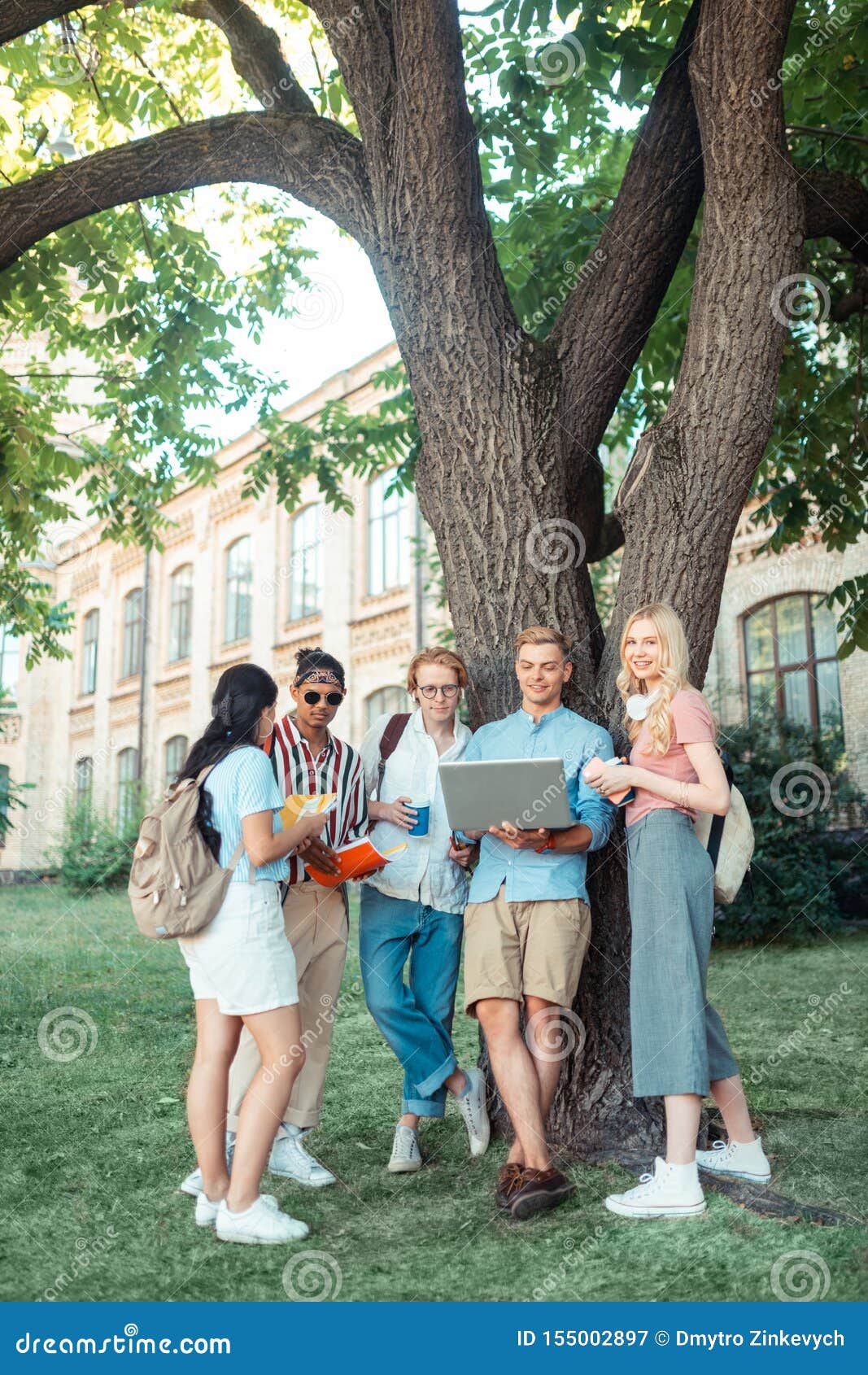 Groupmates Spending Time Together in the University Yard. Stock Image ...