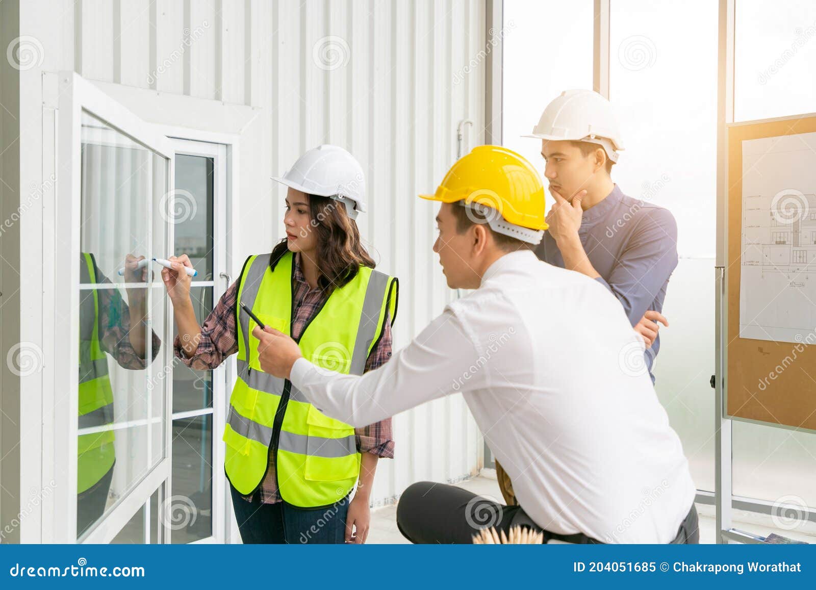 Groups of Construction Engineers Working Together in Workplace Site ...