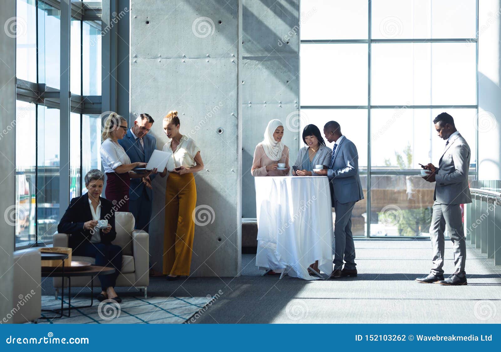 Groups of Diverse Colleagues Interacting with Each Other Stock Photo ...