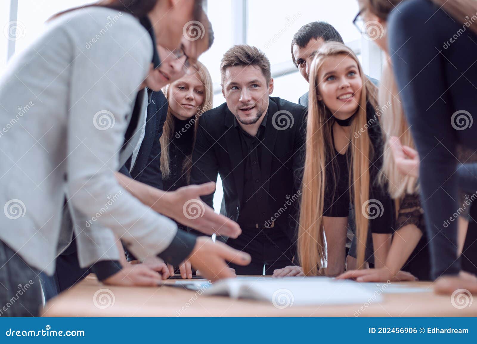 Groups of Employees Standing Near the Desktop. Stock Photo - Image of ...