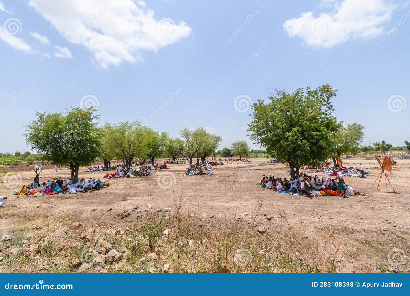 Groups of People Sitting Under the Trees for Shade Editorial Stock ...
