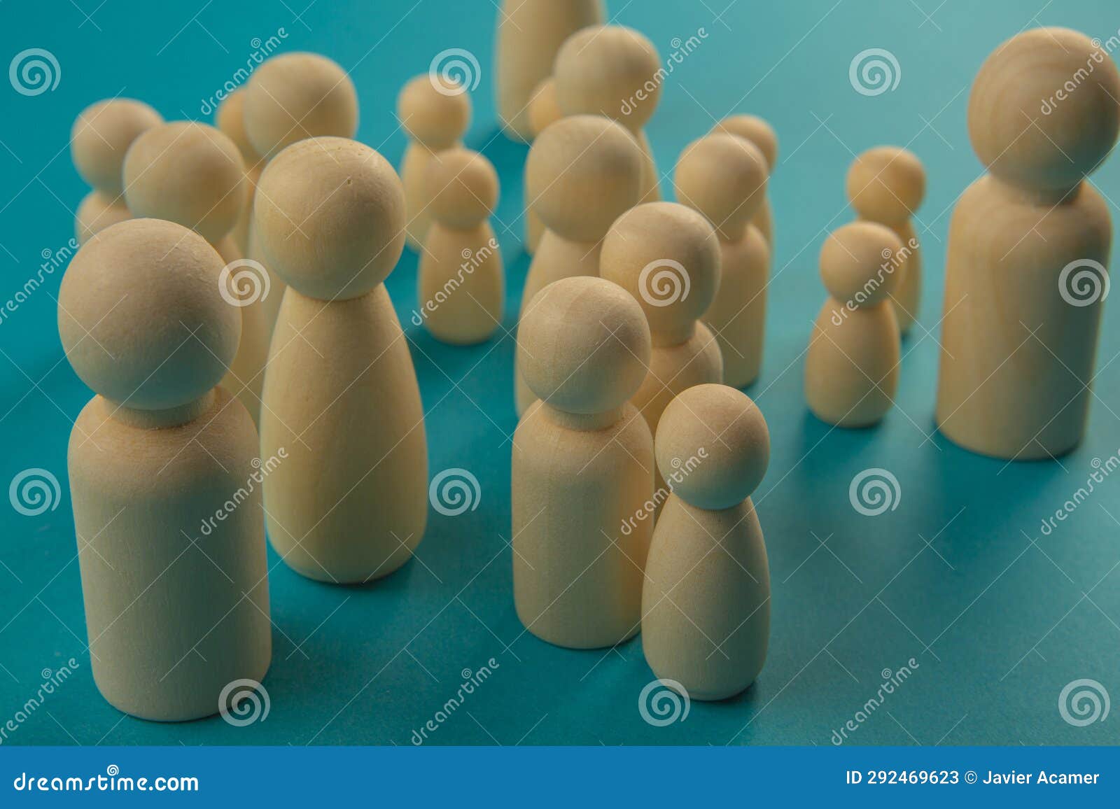 Groups of Wooden Tokens Simulating People of Different Types Grouped ...