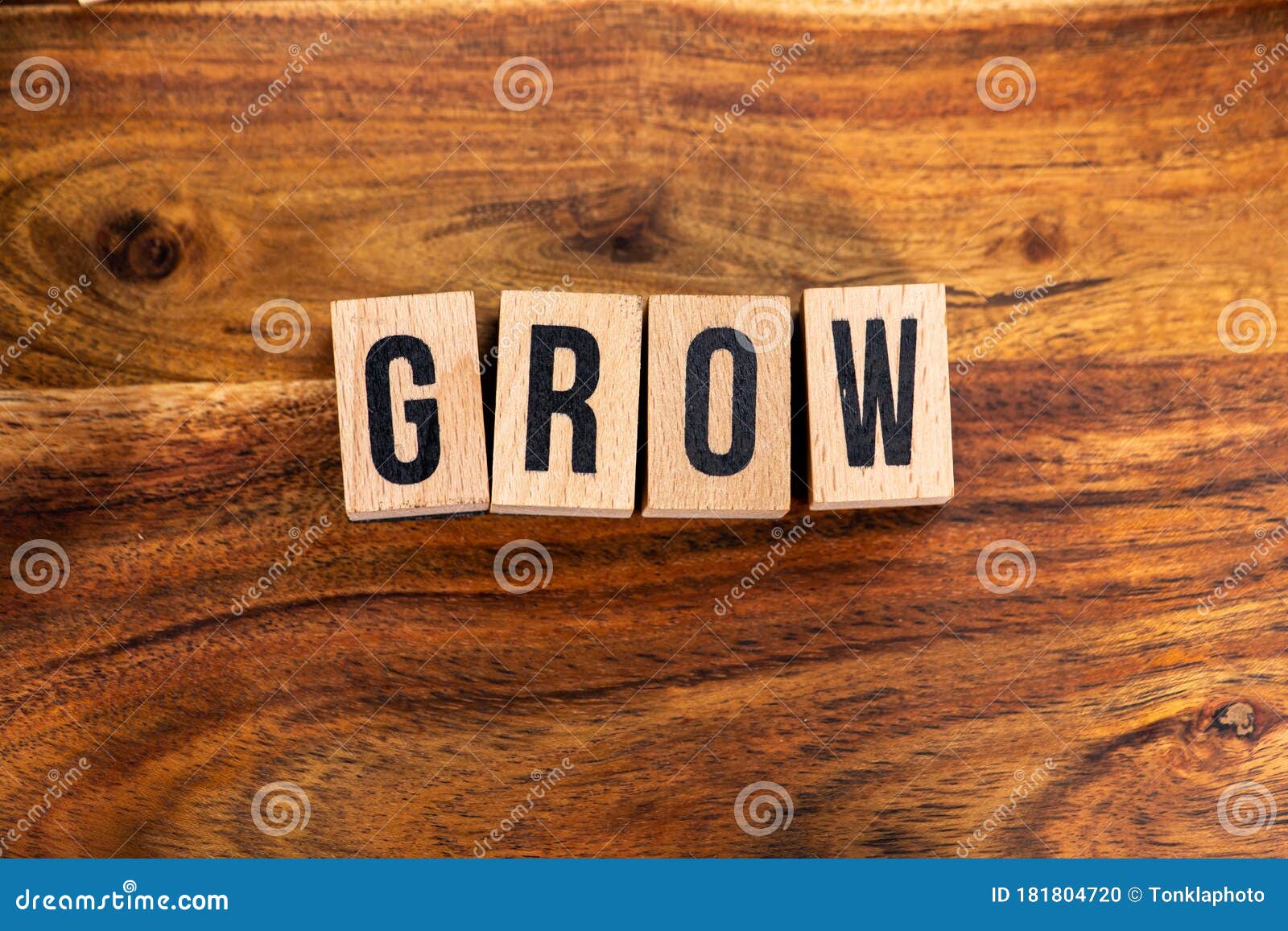 ` GROW ` Text Made of Wooden Cube on Wooden Background Stock Photo ...
