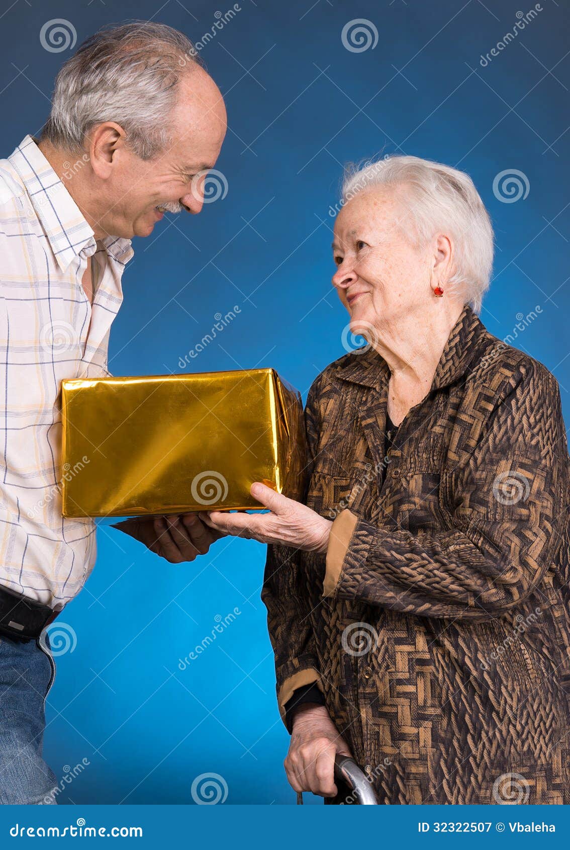 A Grown Son and Aging Mom with Present Box Stock Image - Image of ...