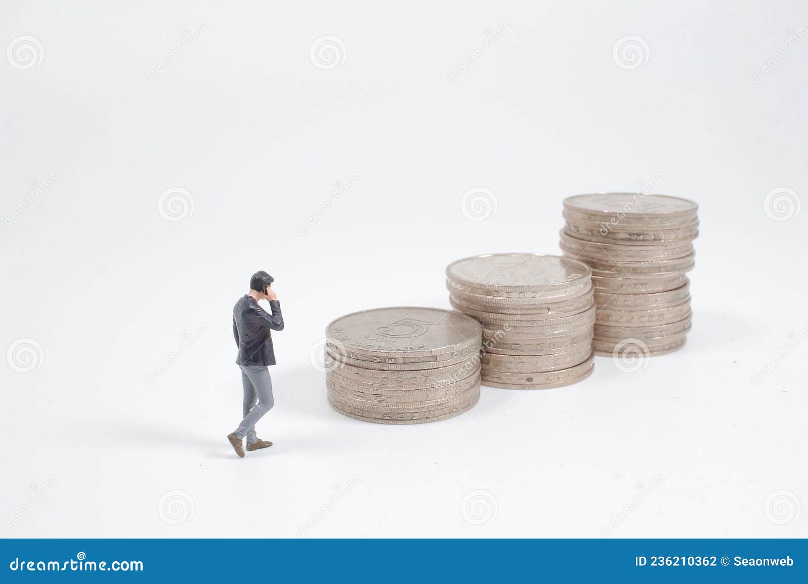 A Growth Concept. Businessman Miniature Figure Walking To Stack of ...