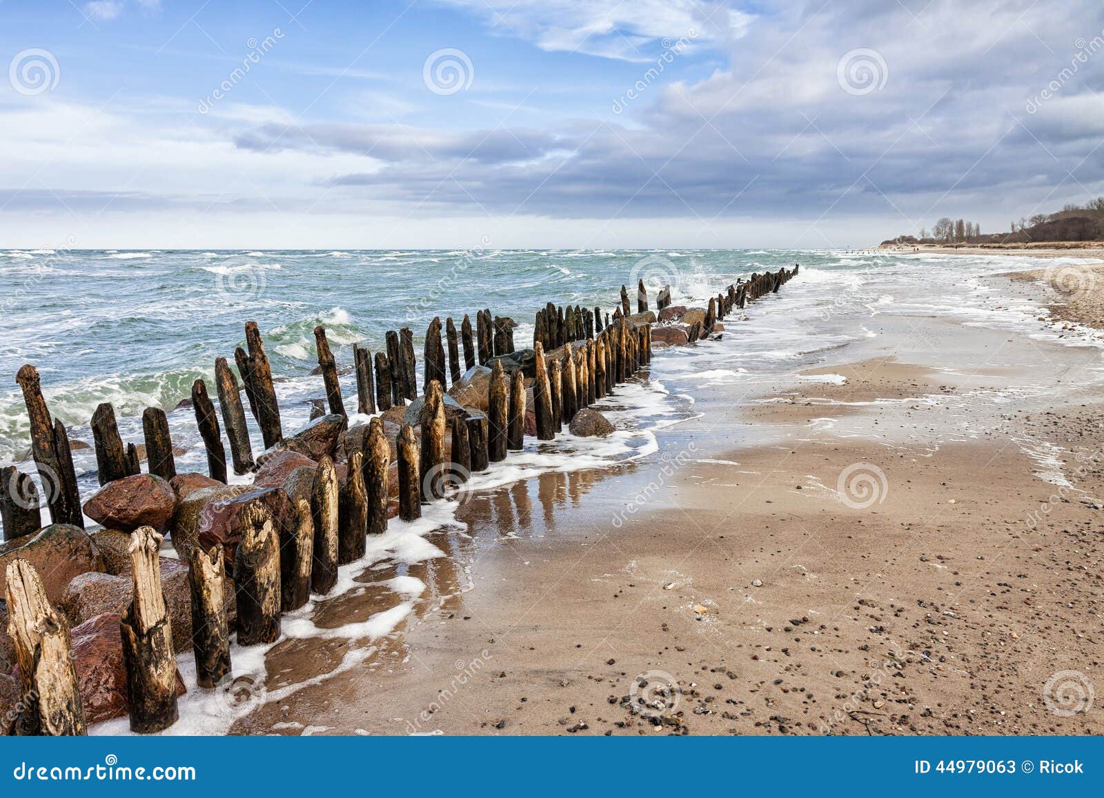 Groyne on shore stock image. Image of ocean, clouds, destination - 44979063