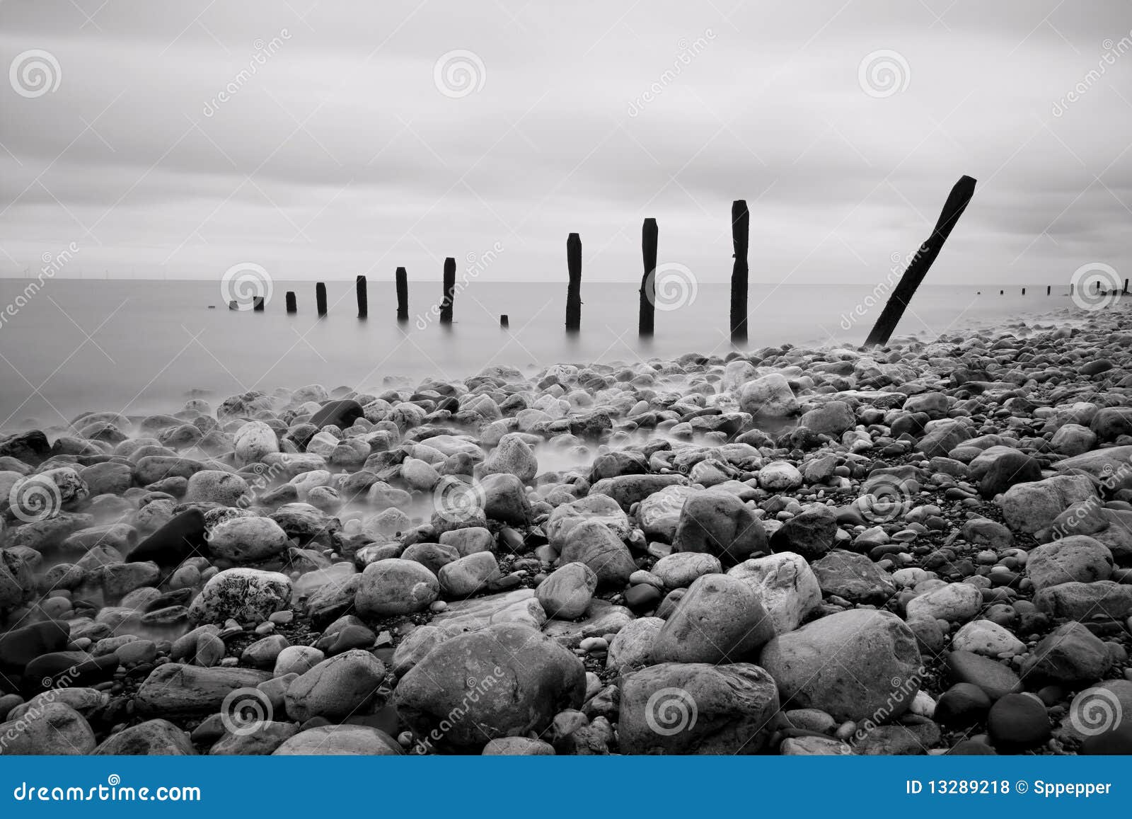 Groynes and Rocks Seascape stock photo. Image of evening - 13289218