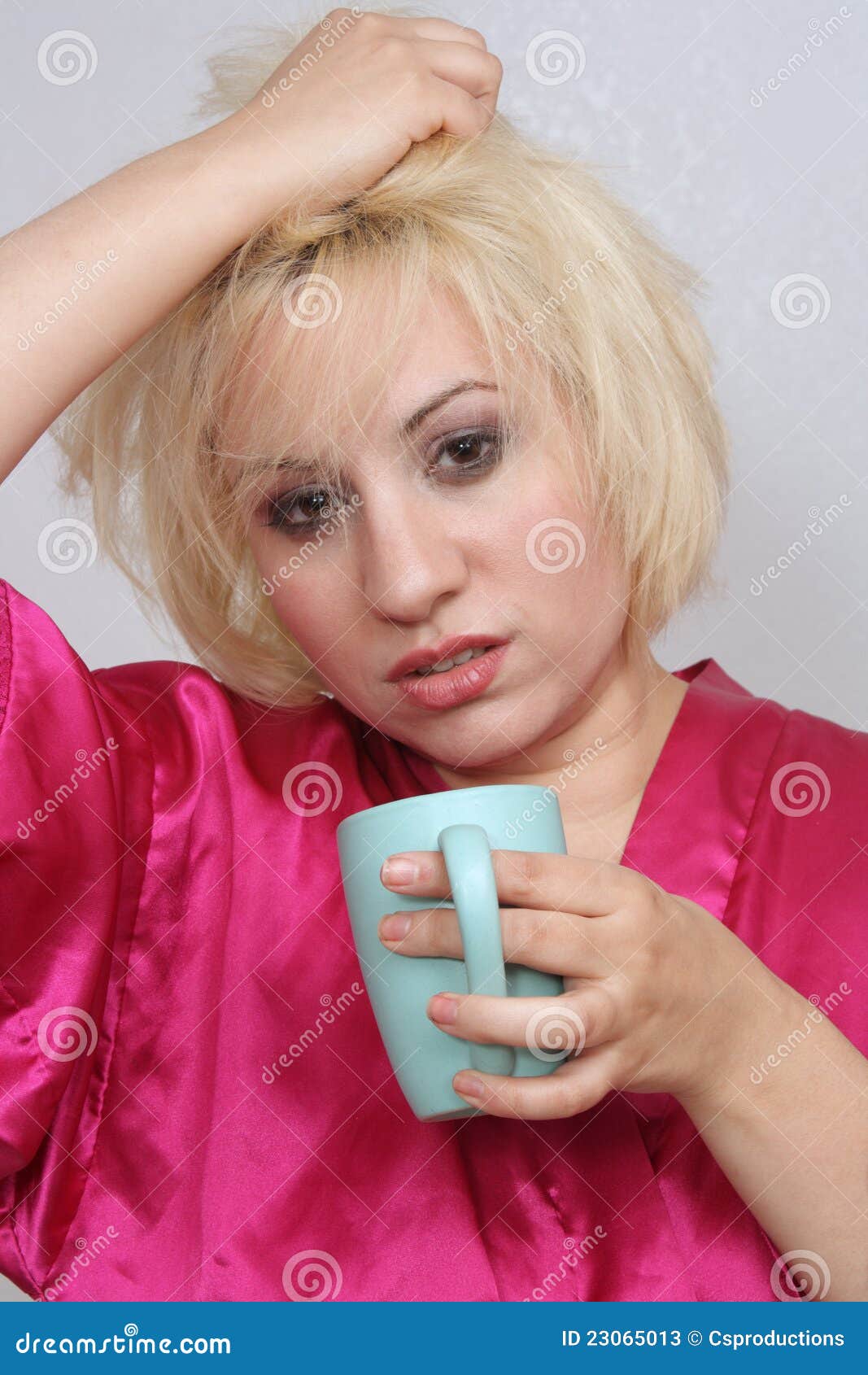 Grumpy Blonde Drinking Coffee (2) Royalty-Free Stock Photography ...