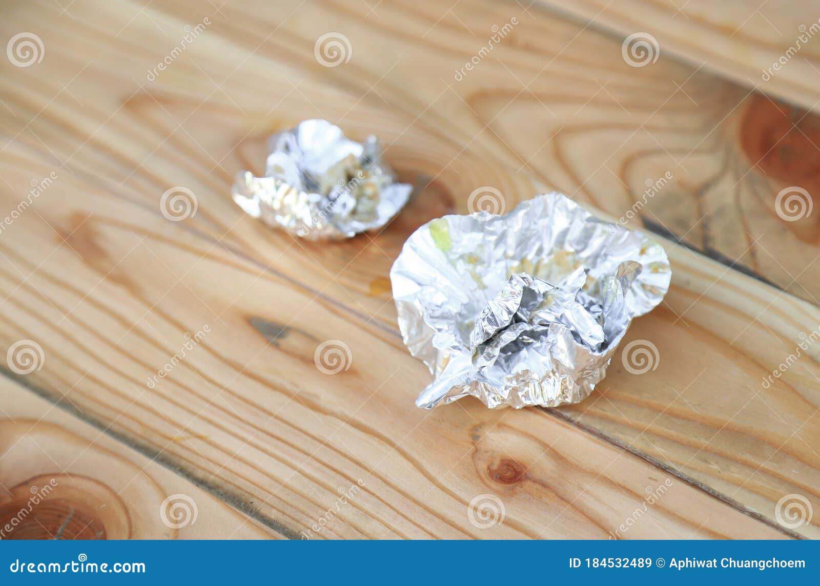 Grumpy Foil Garbage on Wooden Table Stock Image - Image of blue ...