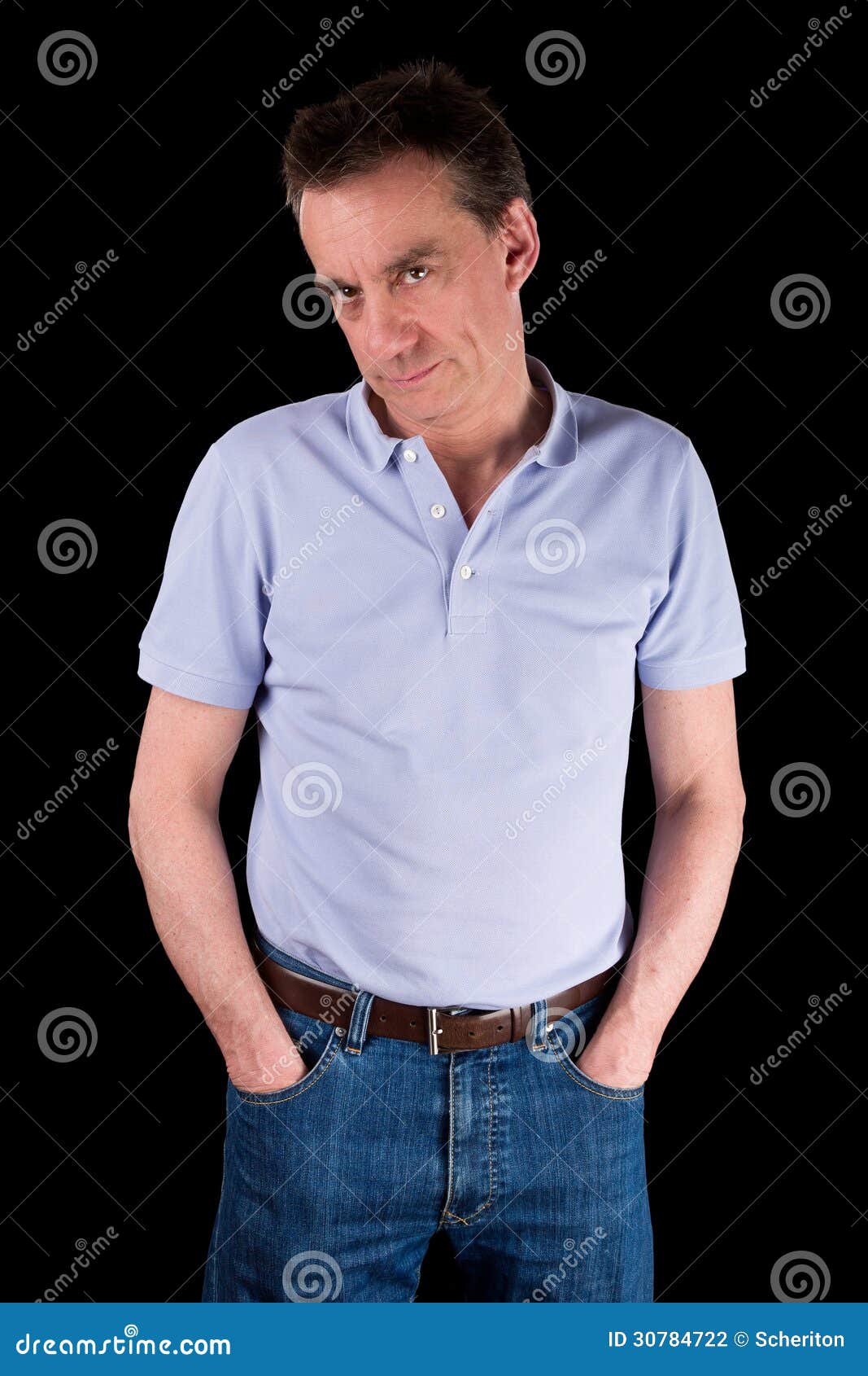 Frowning Grumpy Teen Boy Standing With Folded Arms Over Blue Background ... Frowning Grumpy Teen Boy Standing With Folded Arms Over Blue Background ...