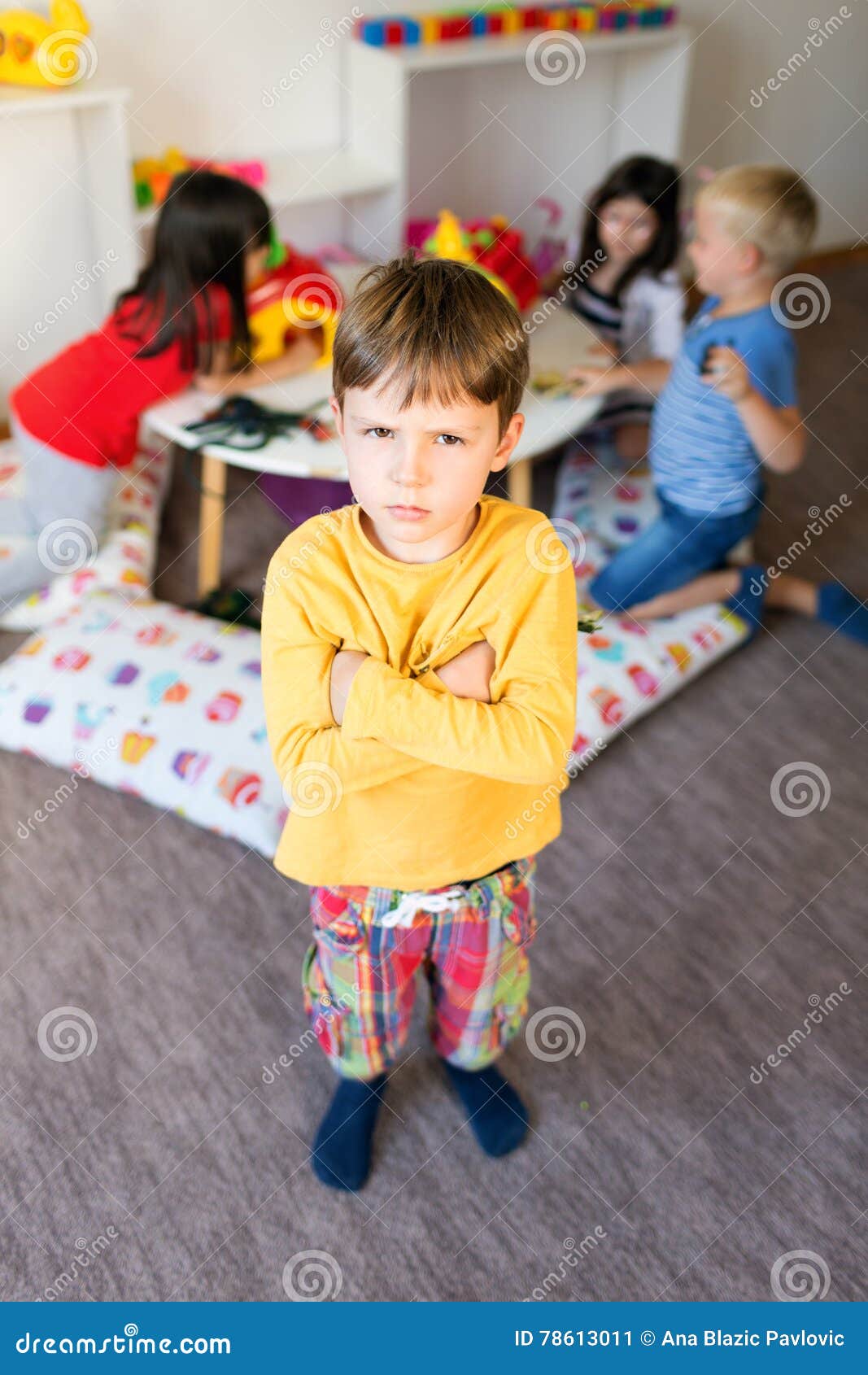Grumpy in kindergarten stock image. Image of depth, children - 78613011