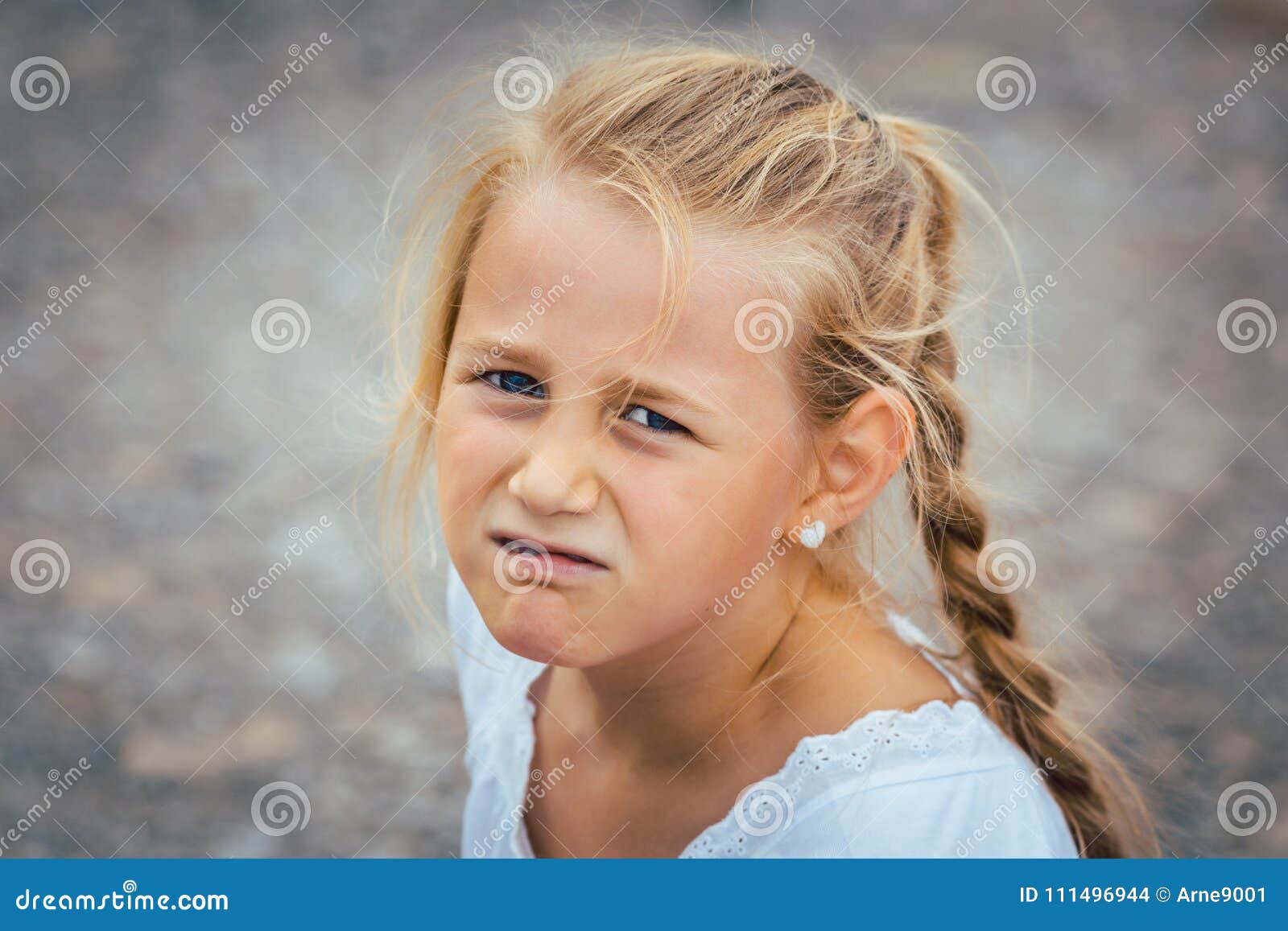 Grumpy Girl Looking into Camera Stock Photo - Image of playing ...