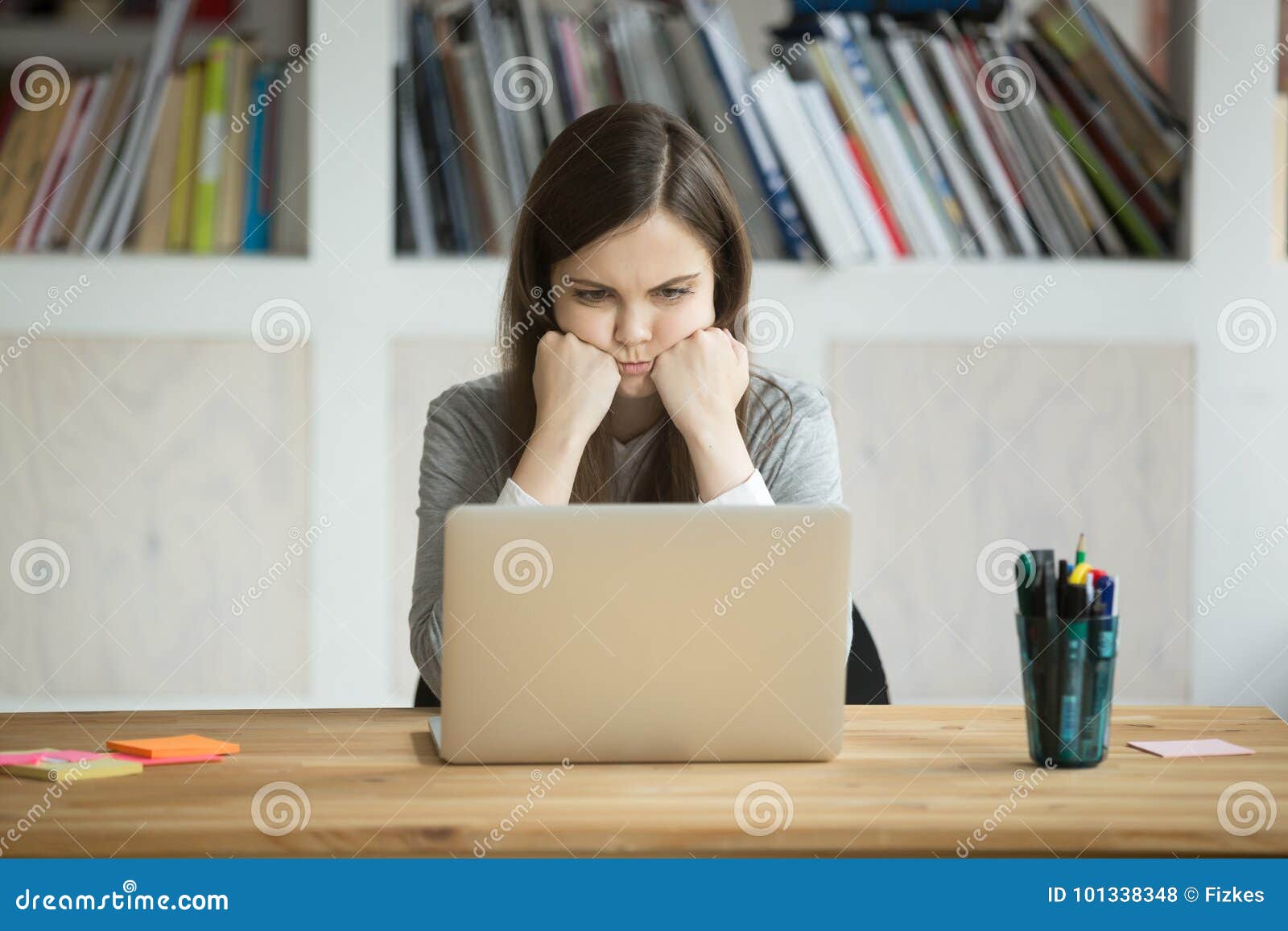 Grumpy Not Amused Office Worker Looking at Laptop Screen. Stock Photo ...