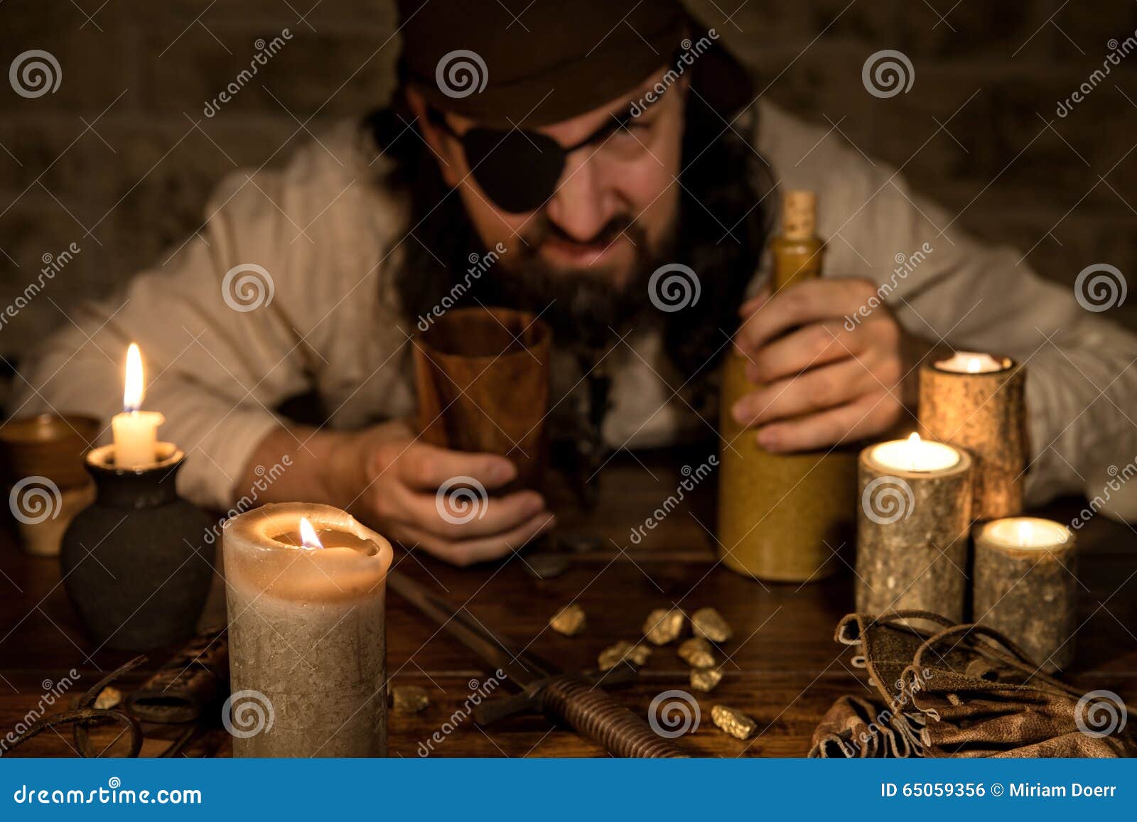 Grumpy Pirate with a Bottle of Rum Sitting on a Medieval Table Stock ...