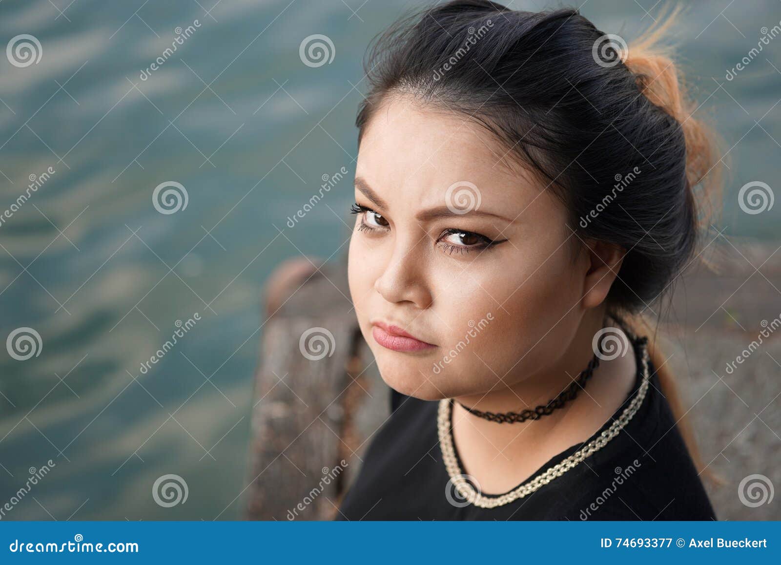 Grumpy young asian woman stock image. Image of grumpy - 74693377