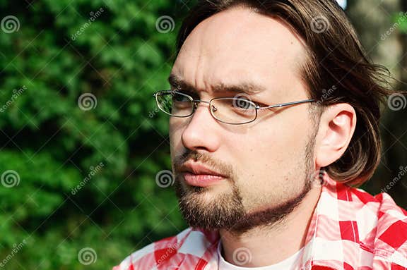 Grumpy young man portrait stock photo. Image of upset - 25880082