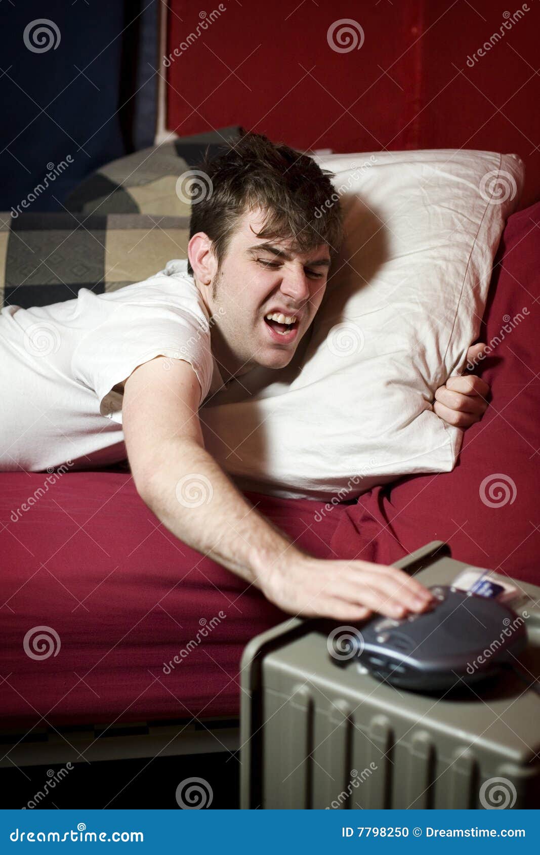 Grumpy young man waking up stock photo. Image of person - 7798250