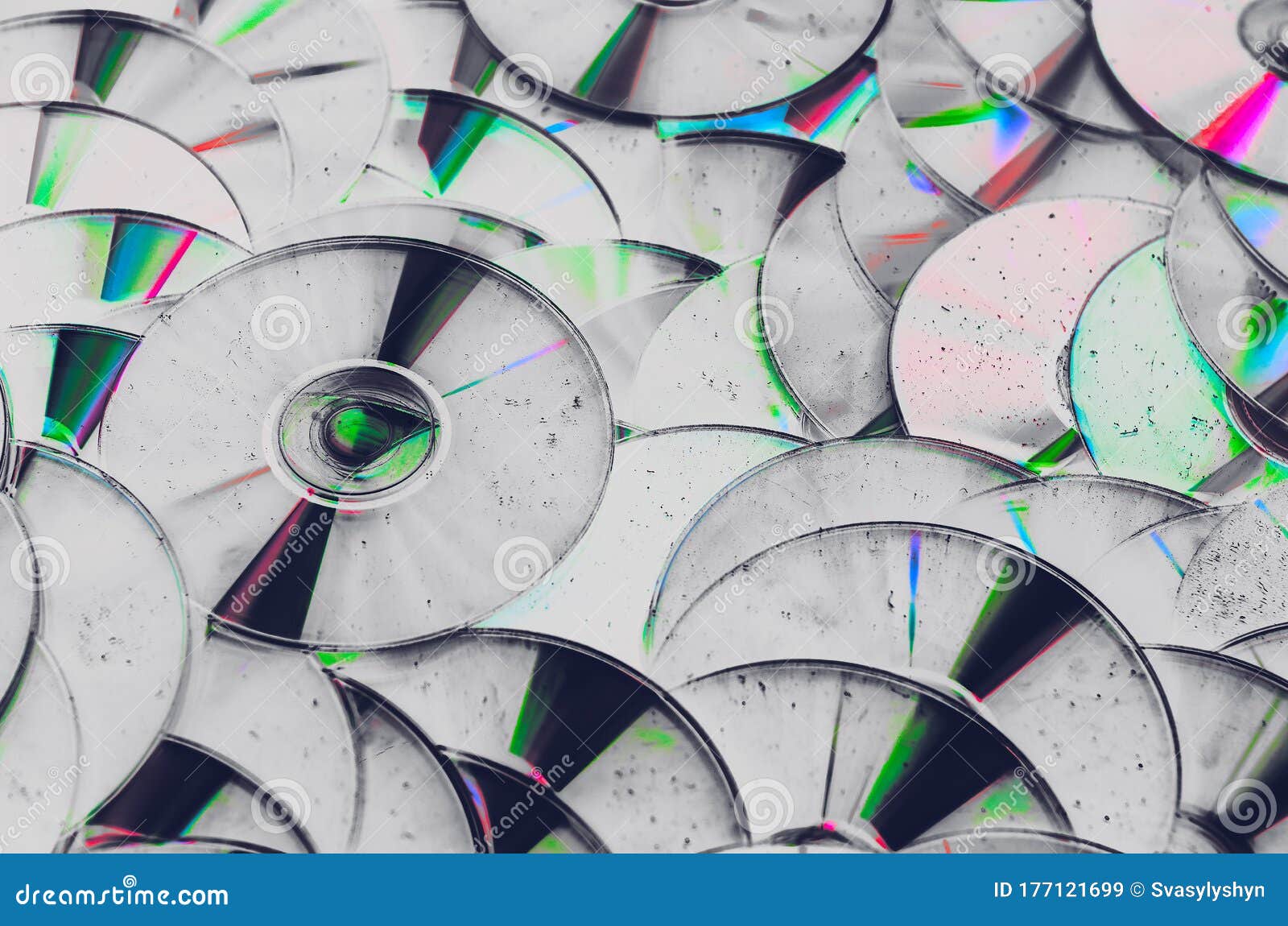 Grunge Backdrop of Old CD DVD Compact Optical Disk Storage Medium with ...