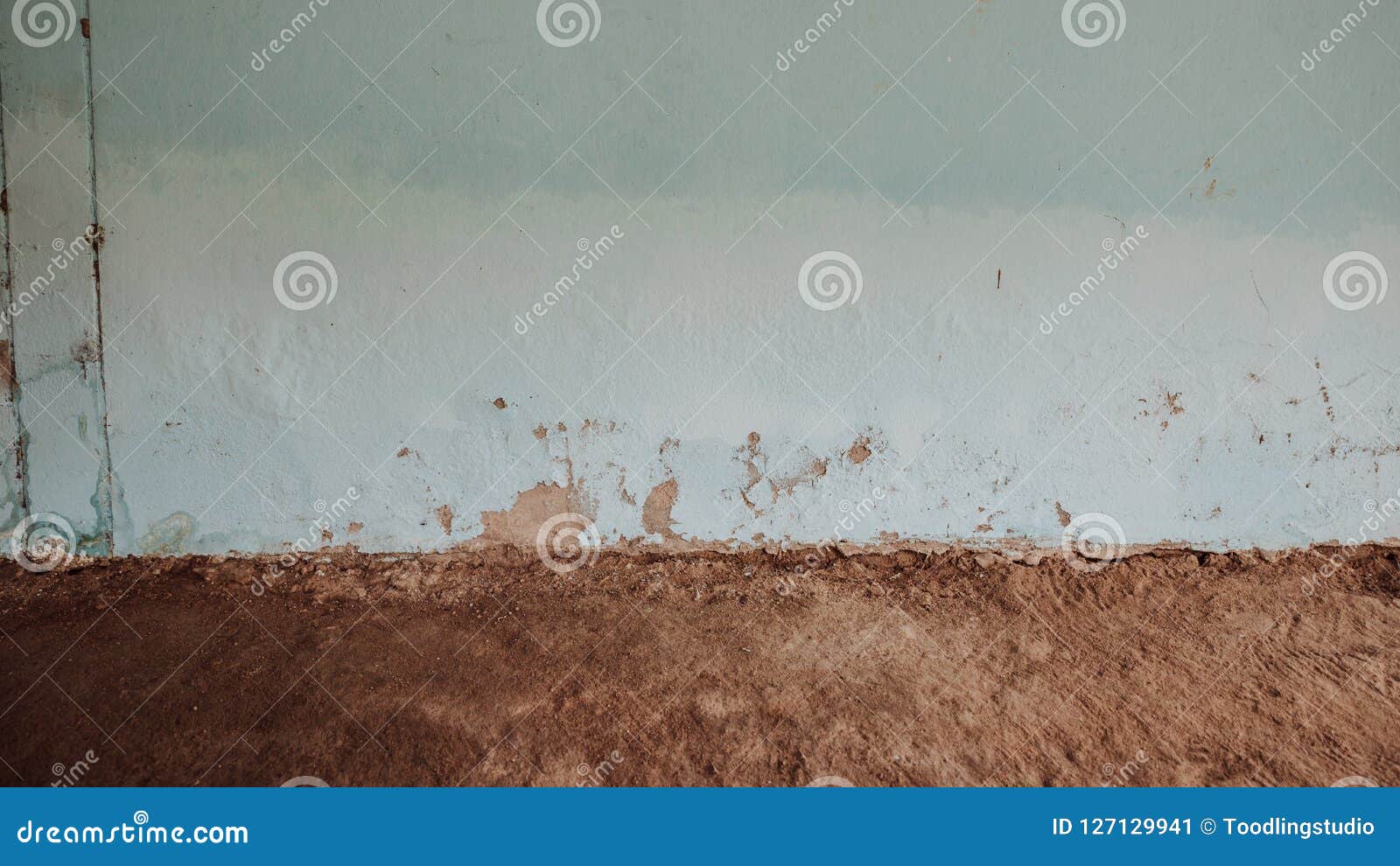 Grunge Concrete Wall on Sandy Soil. Grunge Background. Stock Image ...