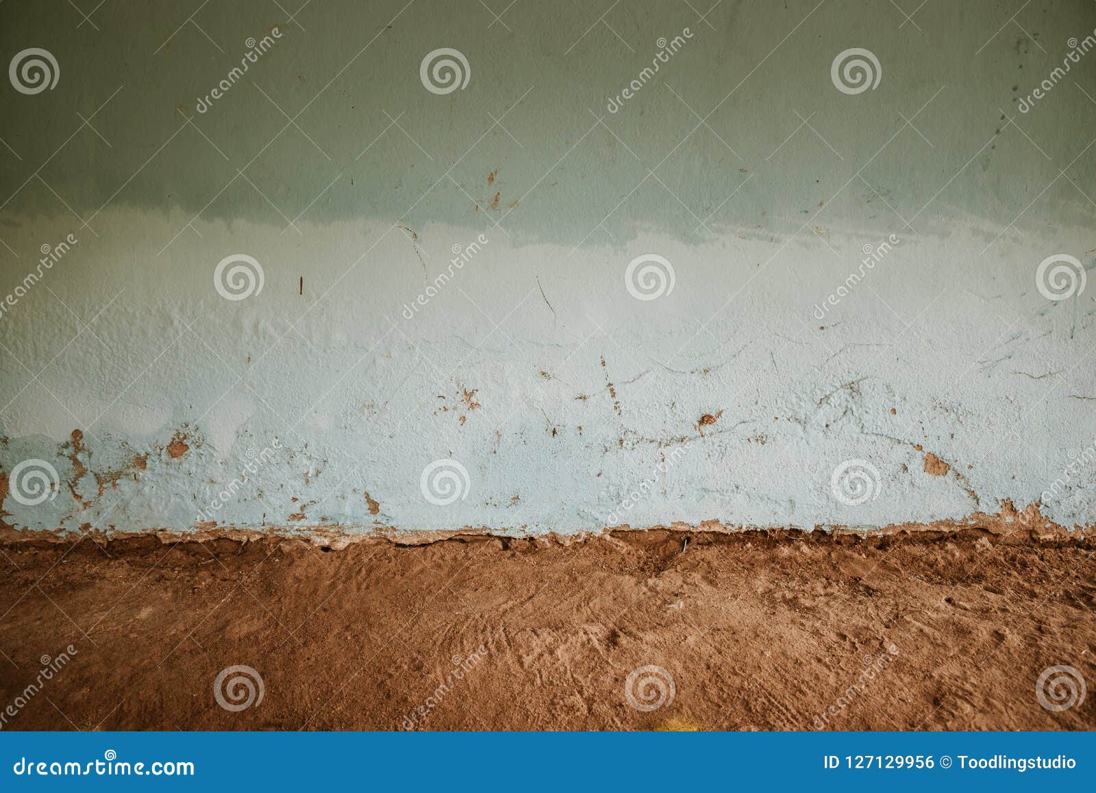 Grunge Concrete Wall on Sandy Soil. Grunge Background. Stock Photo ...