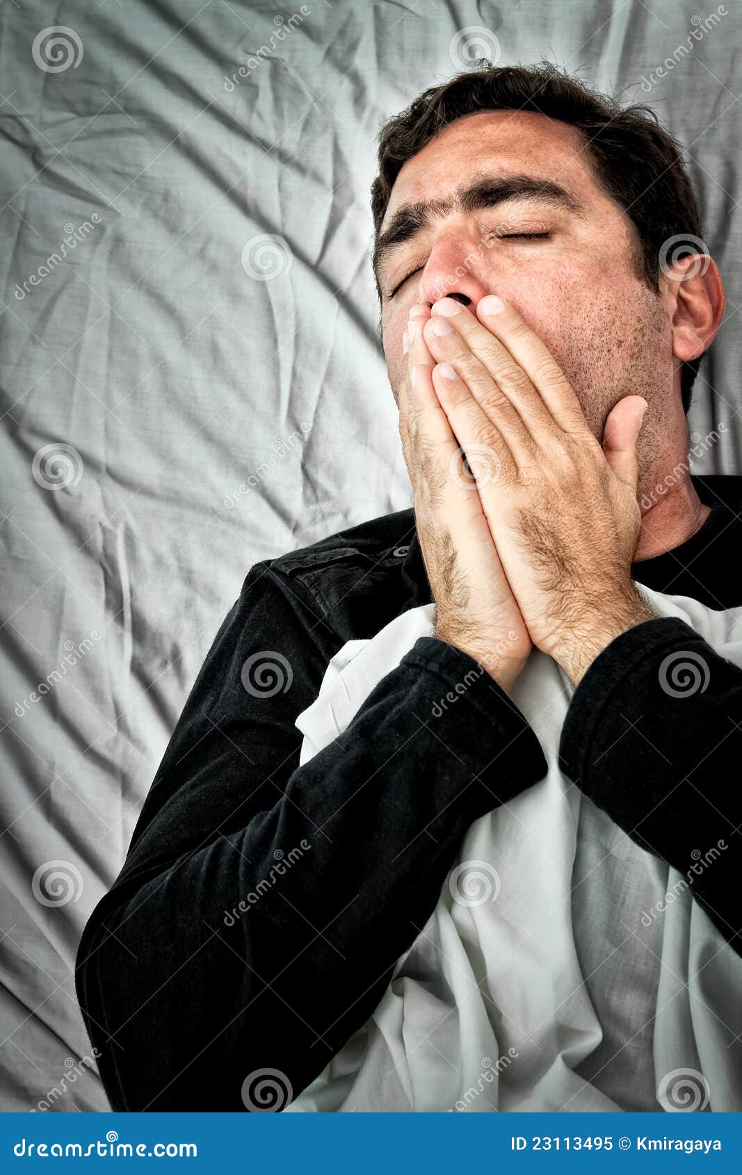 Sick Hispanic Man Laying In Bed With A Thermometer Royalty-Free Stock ...