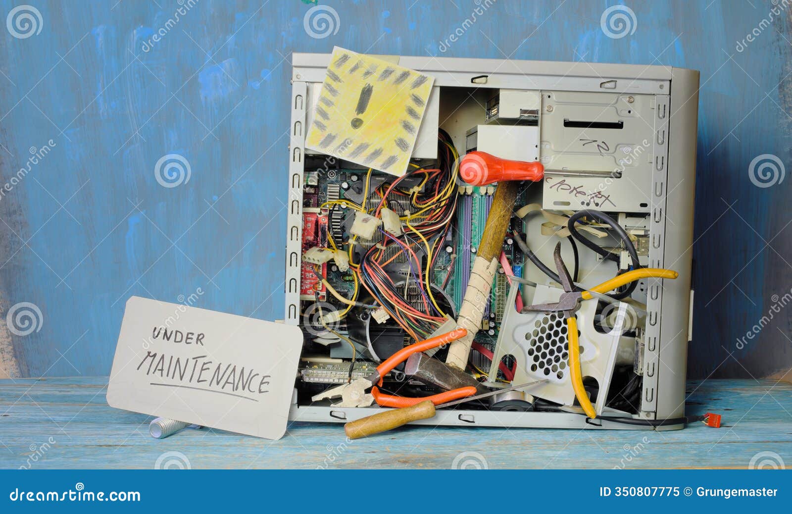 Grungy Demolished Computer with Maintenance Sign,service Not Available ...