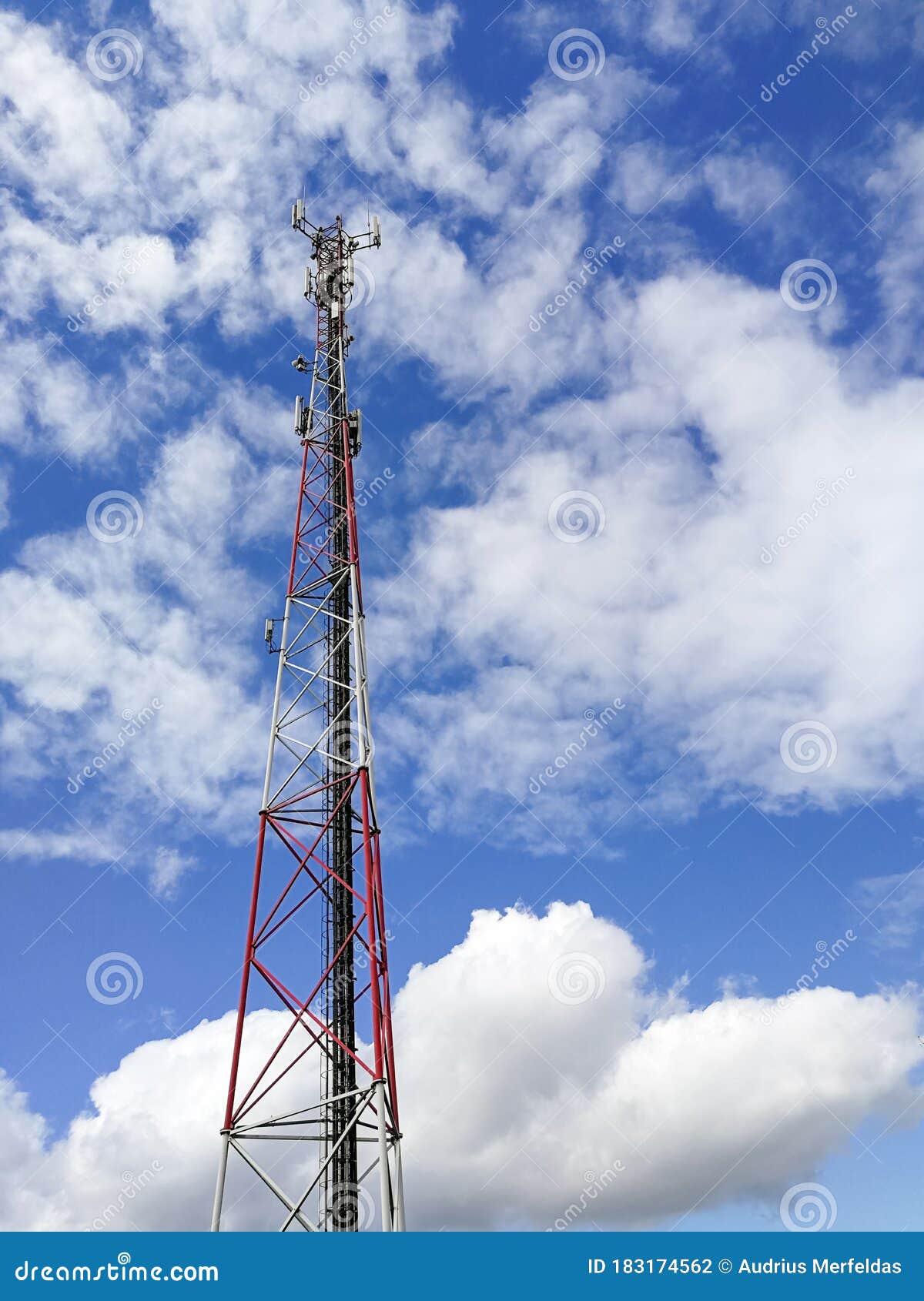 GSM Repeater Tower in Front of Blue Cloudy Sky Stock Photo - Image of ...