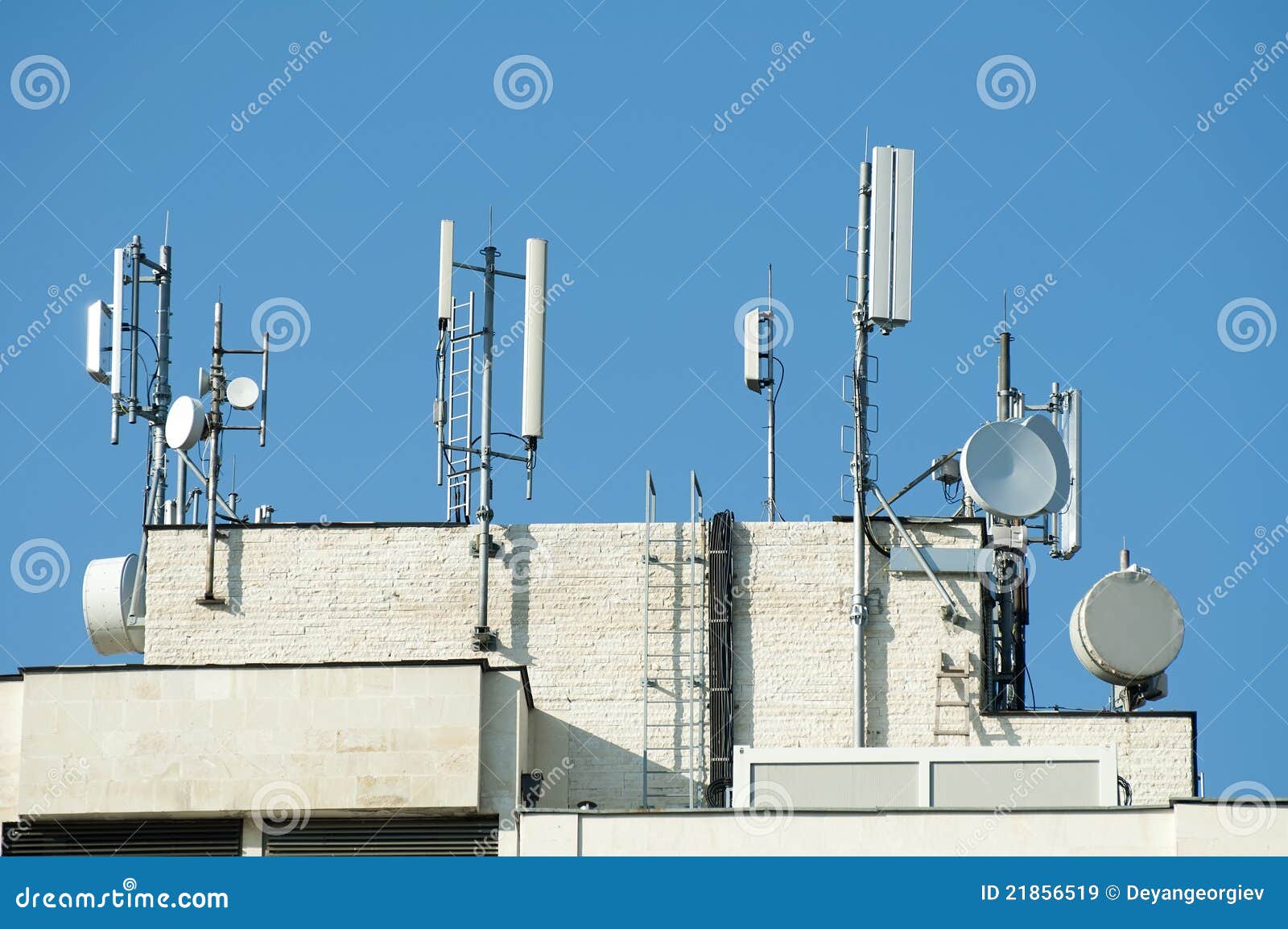 GSM transmitters on a roof stock image. Image of building - 21856519