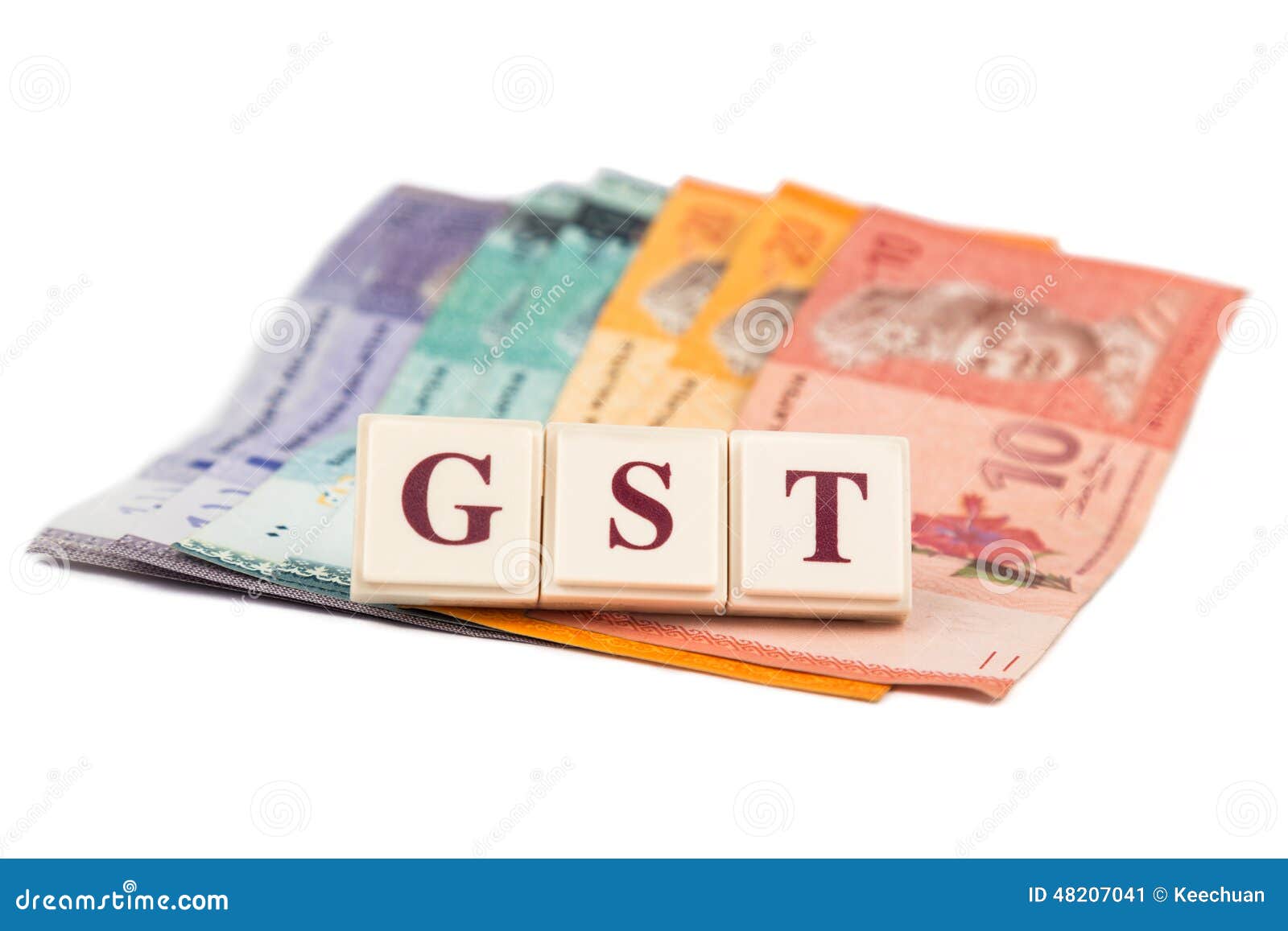 GST TAX Concept with Alphabet from Board Game and Currency Stock Image ...