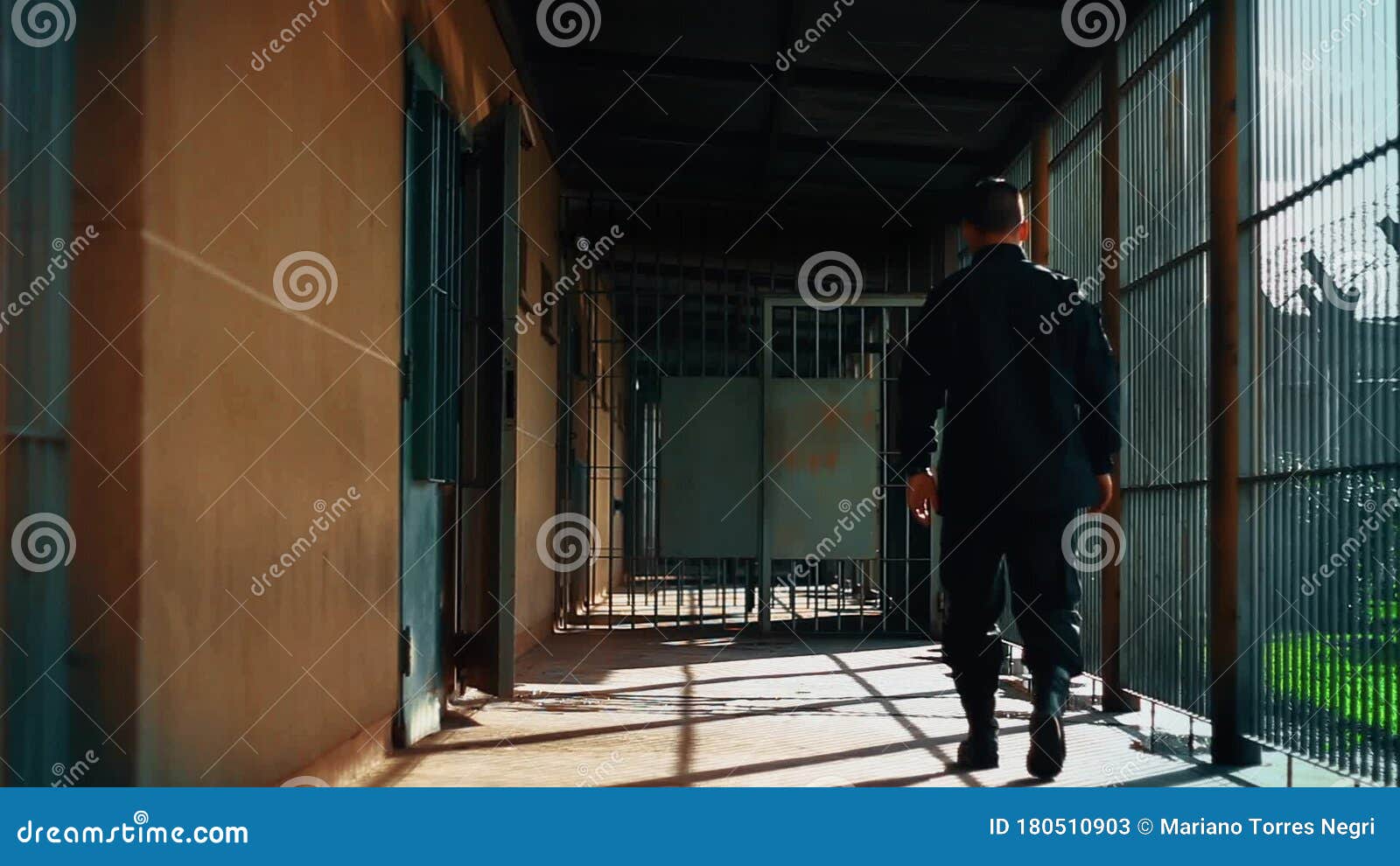 Guard Walking through Prison Hallway Stock Video - Video of criminal ...
