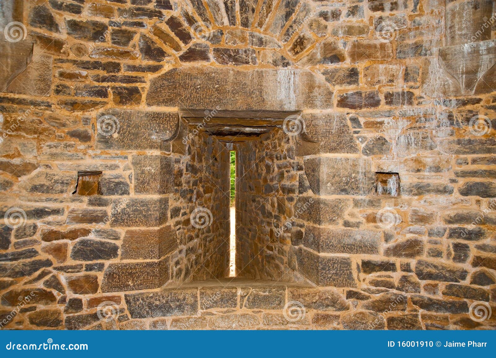 Guedelon castle arrow slit stock photo. Image of stone - 16001910