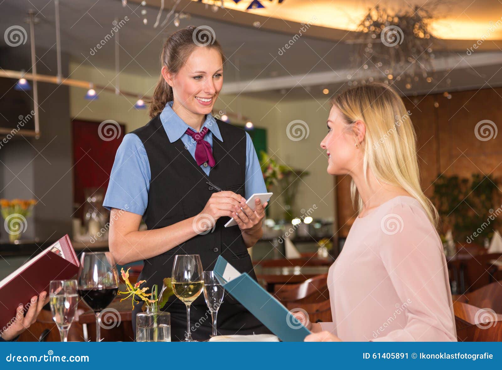Guest in a Restaurant Orders Meal from Menu Stock Image - Image of ...