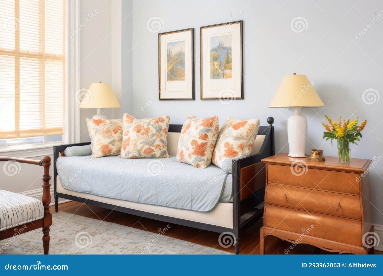 A Guest Room with a Daybed, a Lamp, and a Bedside Table Stock Image ...