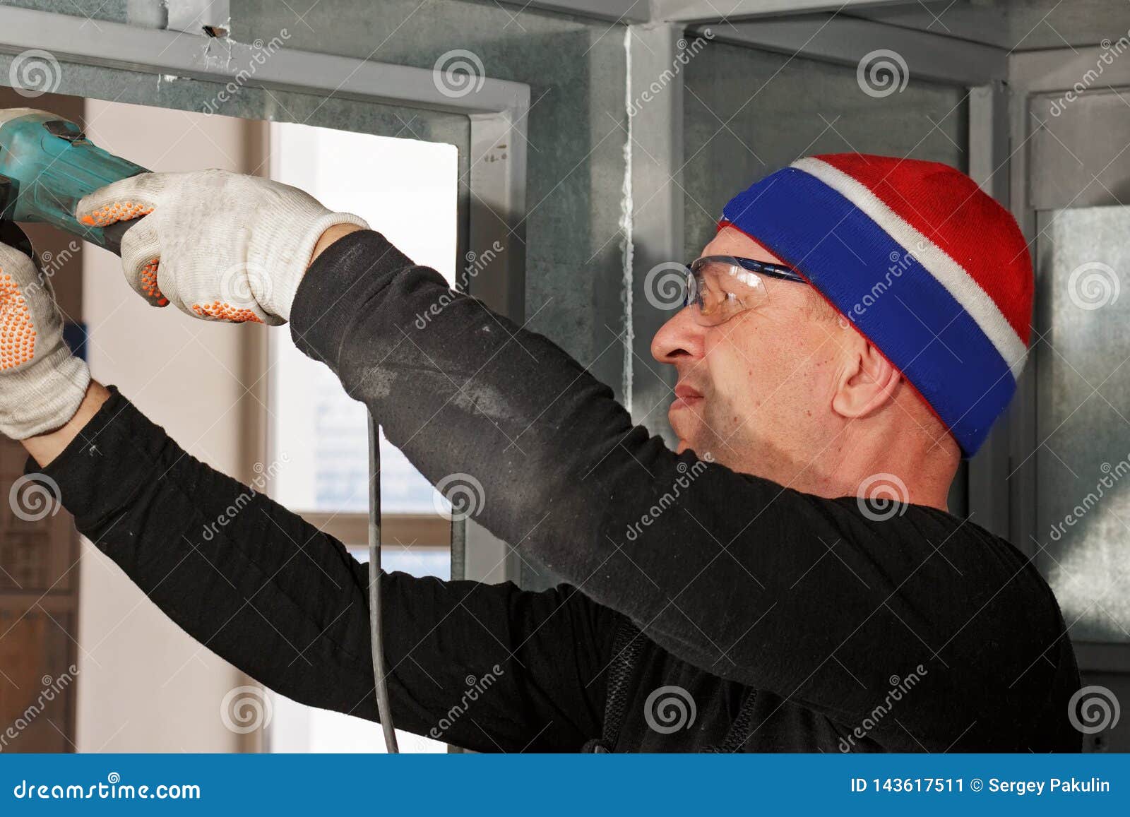 Guest Worker Performs Construction and Manufacturing of Metal ...