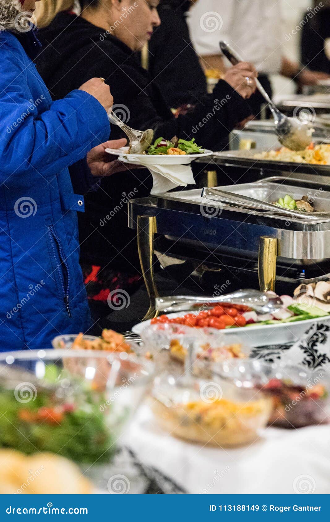 Guests Grabbing Food at a Buffet Editorial Stock Image - Image of ...