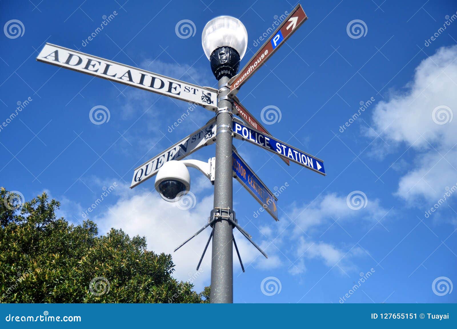 Guide Post and Lamp Pole at beside Road on Adelaide Street Editorial ...