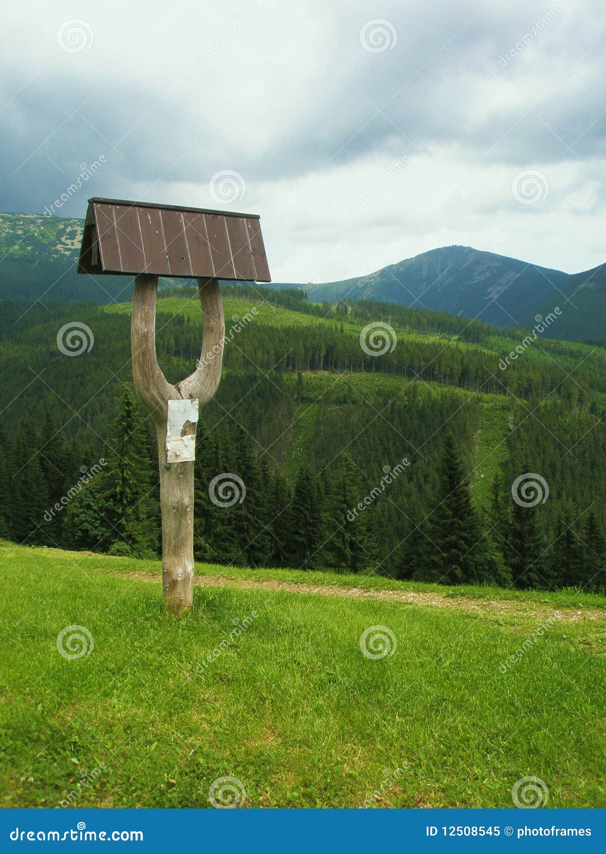 Guidepost in the mountains stock image. Image of meadow - 12508545