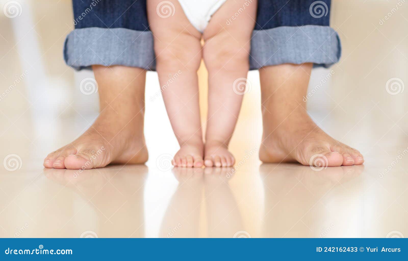 Guiding Steps. Cropped Image of a Baby Learning To Walk. Stock Image ...