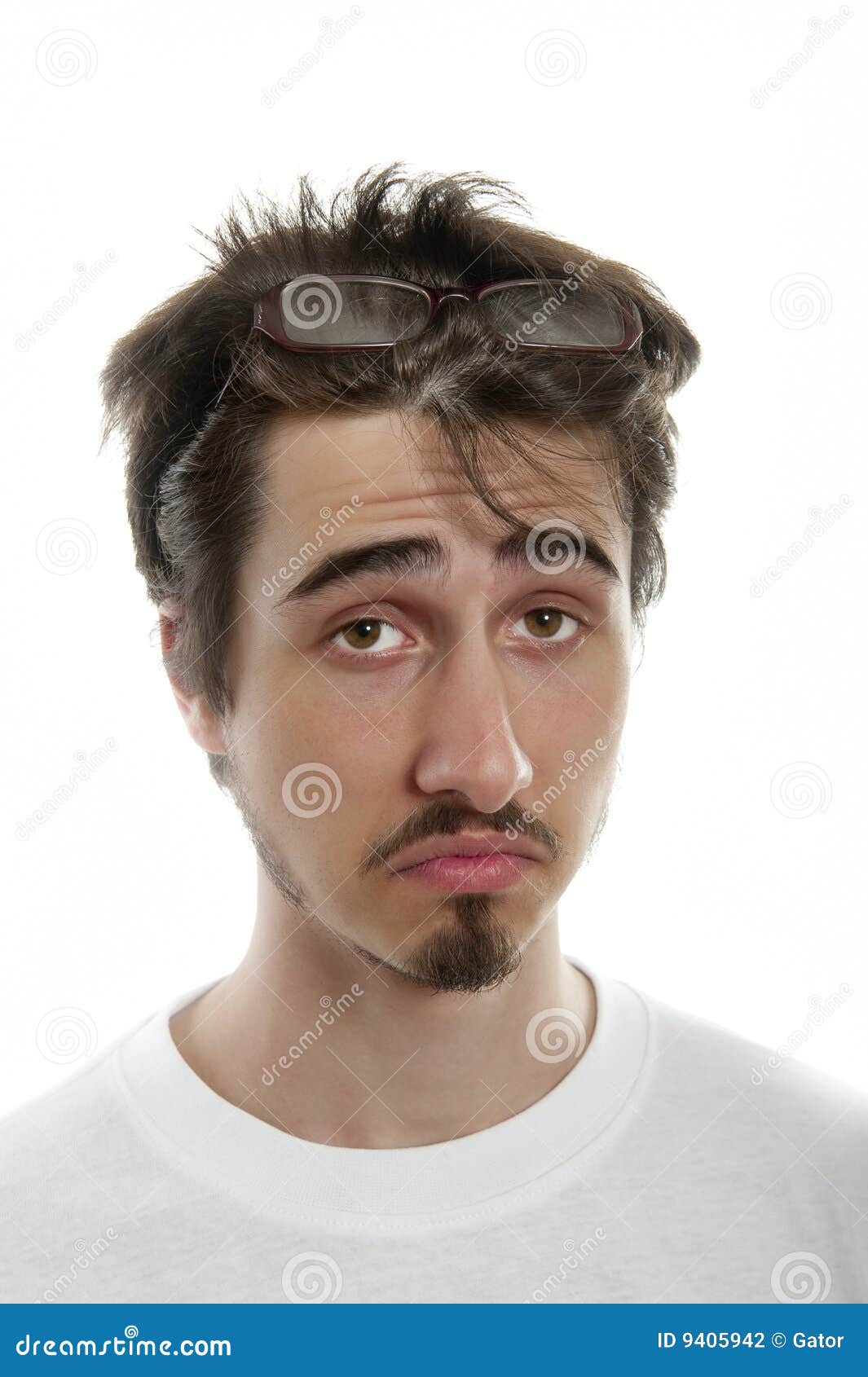 Guility looking young man stock photo. Image of portrait - 9405942