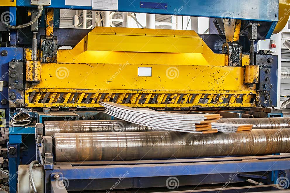 Industrial Metal Guillotine Machine in Operation at a Workshop, Cutting ...
