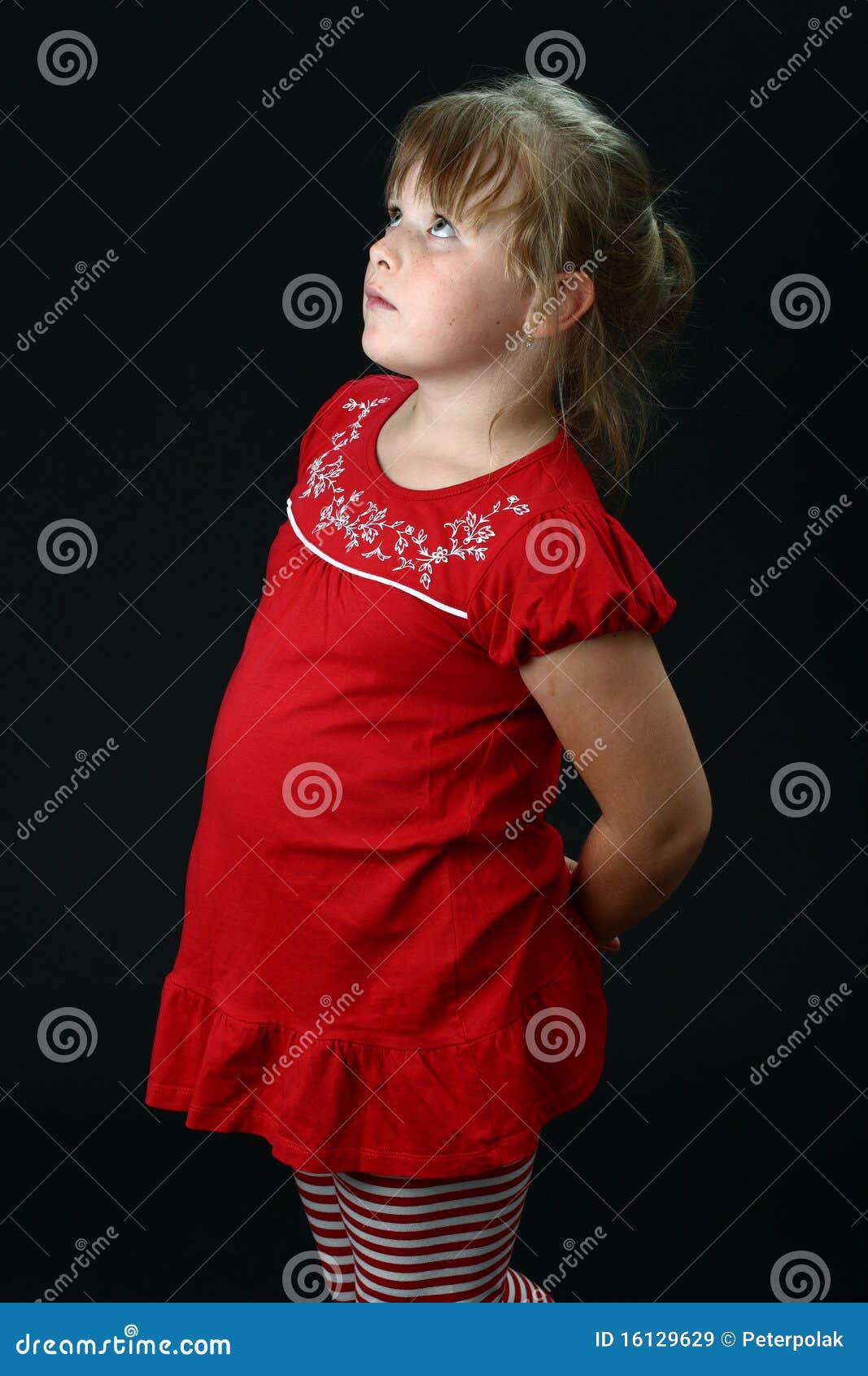 Guilty Girl Looks Up with Hands Behind Her Back Stock Image - Image of ...