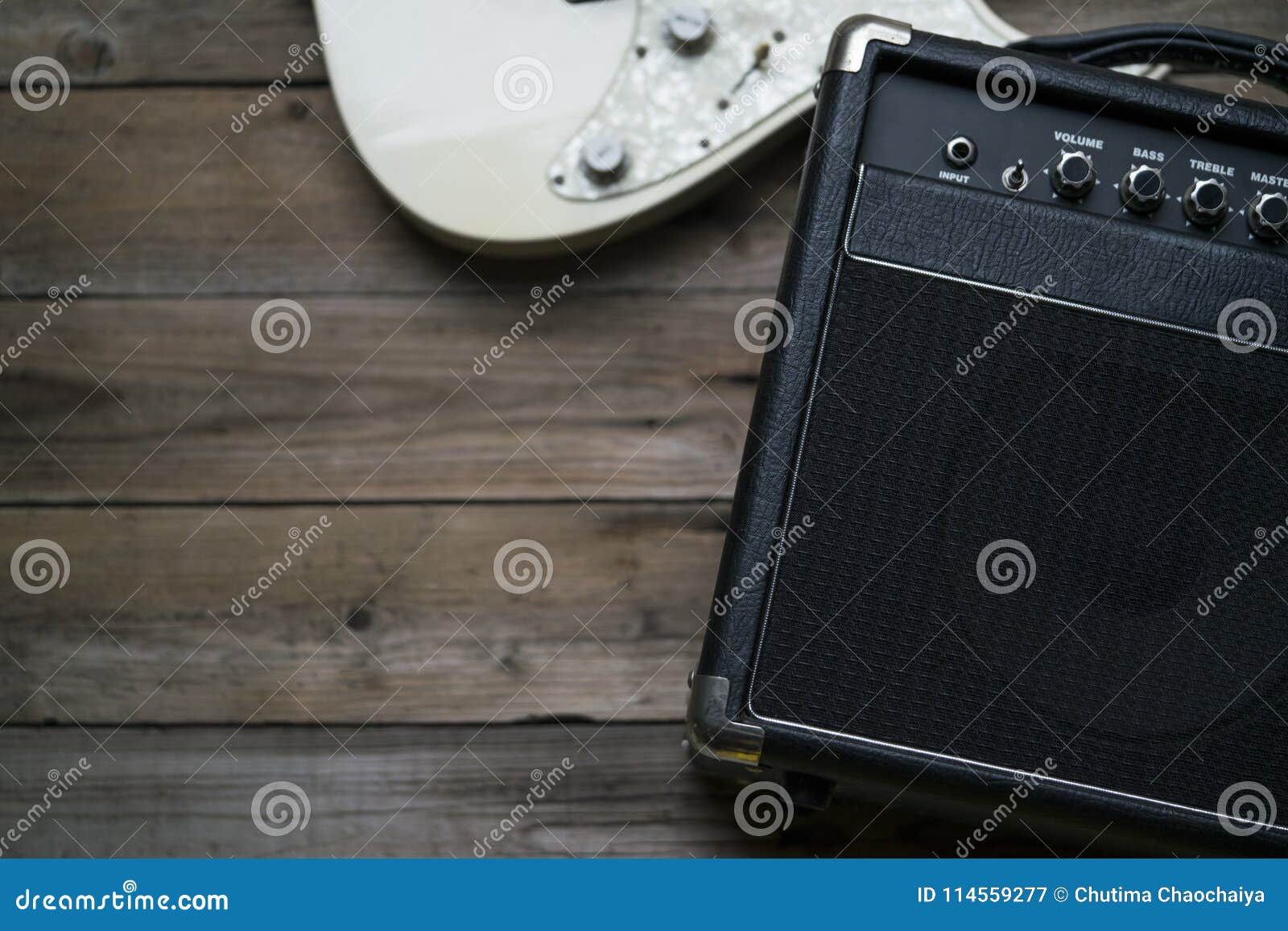 Guitar Amplifier and a Electric Guitar on Wood Table Stock Image ...