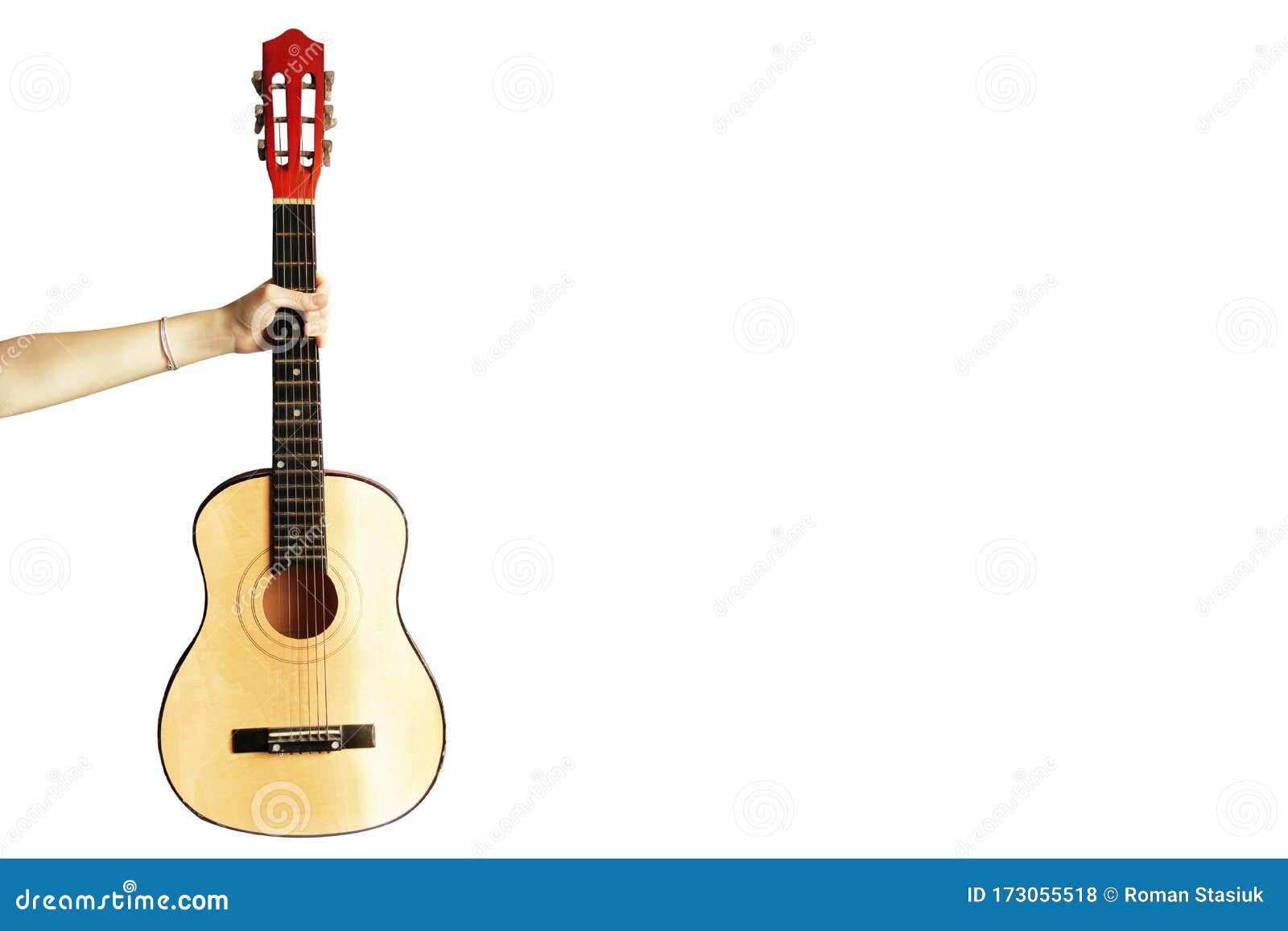 Guitar in a Hand on a White Background. Musical Instrument Stock Photo ...