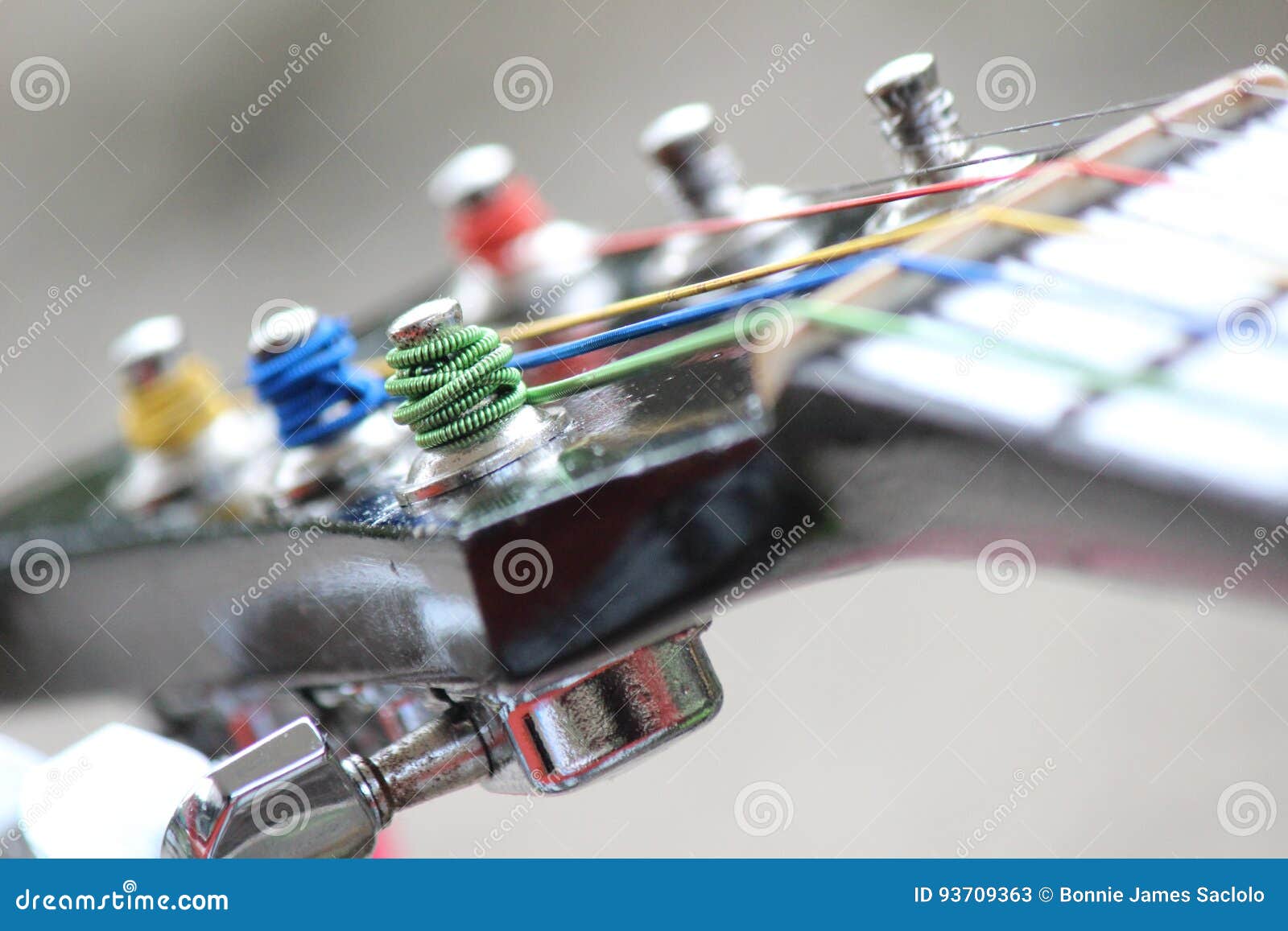 Guitar Head with Colored Strings Stock Image - Image of guitar, close ...