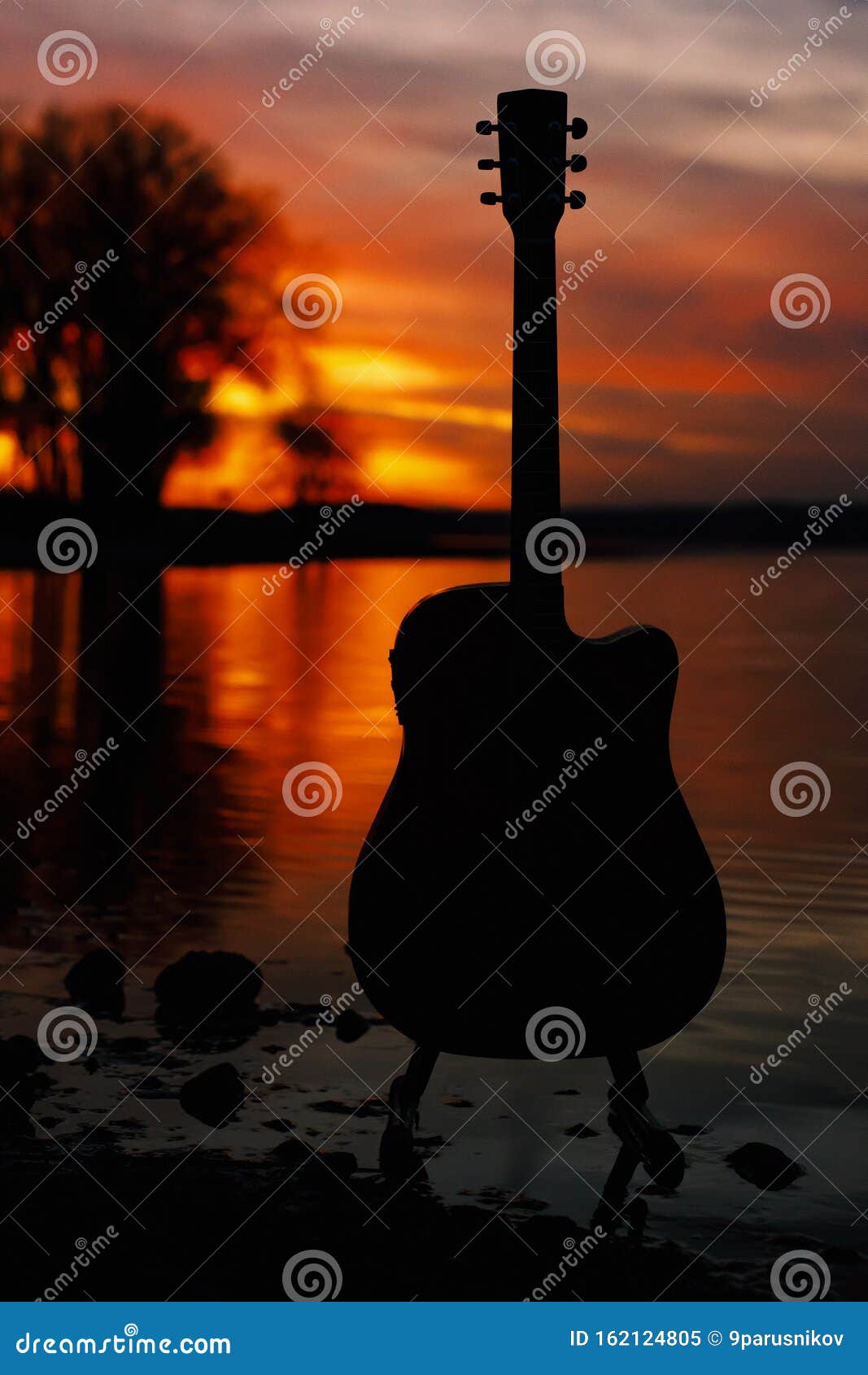 Guitar by the Lake at Sunset Time Stock Image - Image of music, concert ...