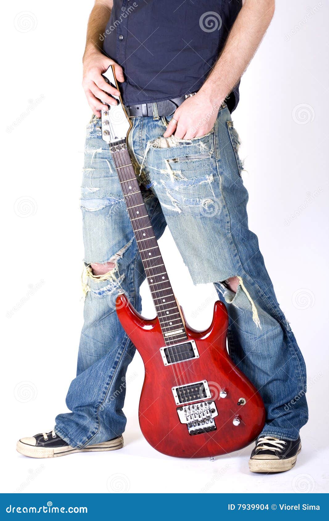 Guitar between the Legs of a Guitaris Stock Photo - Image of metal ...