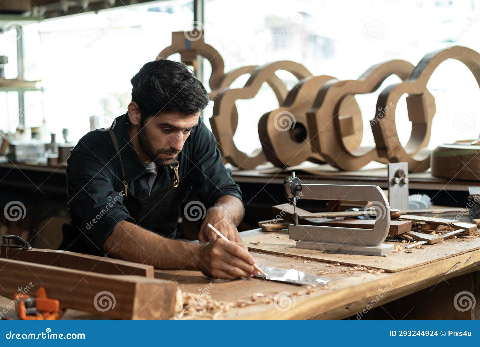 Guitar Luthier Drawing Fingerboard Shape with Acrylic Pattern Stock ...