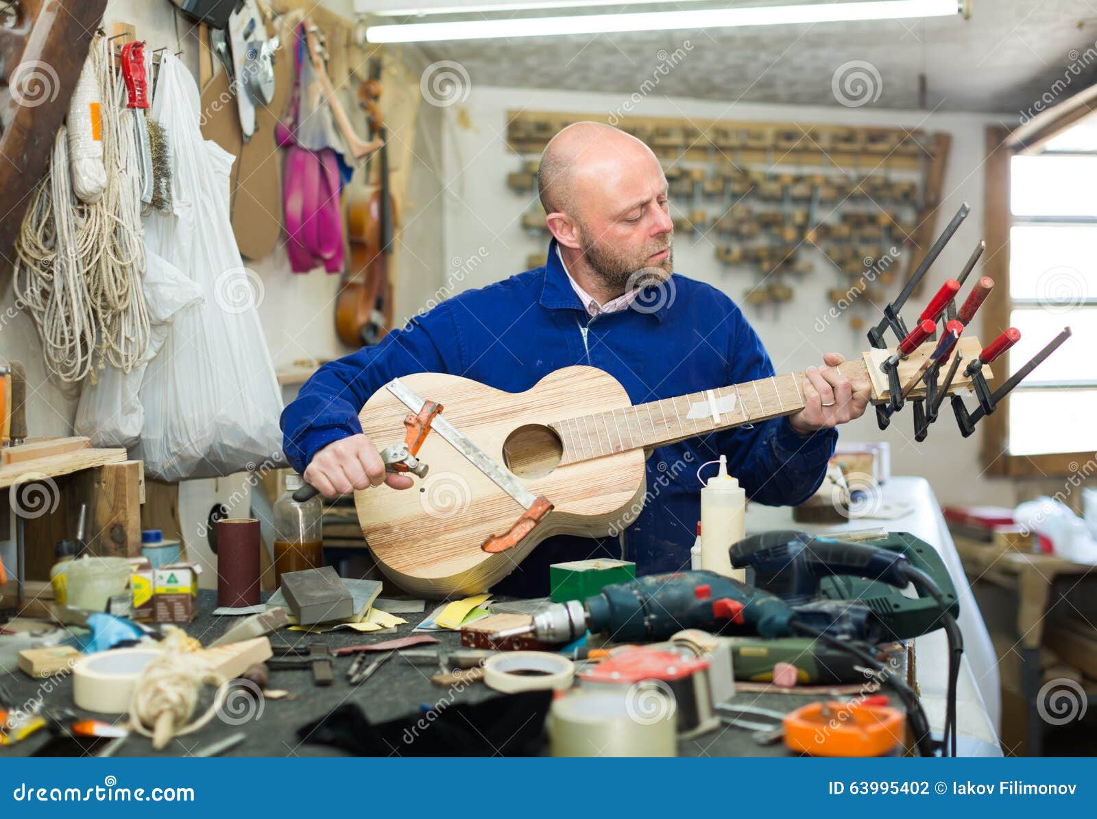 Guitar-maker at workshop stock photo. Image of caucasian - 63995402