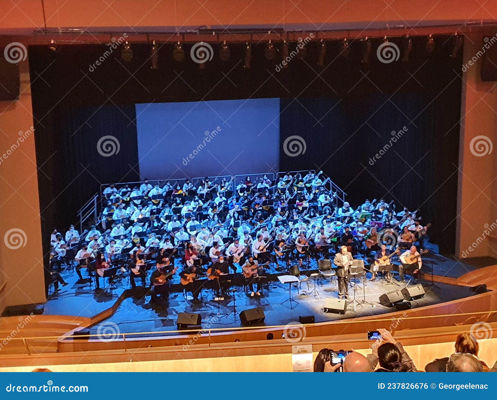 A Guitar Orchestra Performing in a Theatre Stage Editorial Photo ...